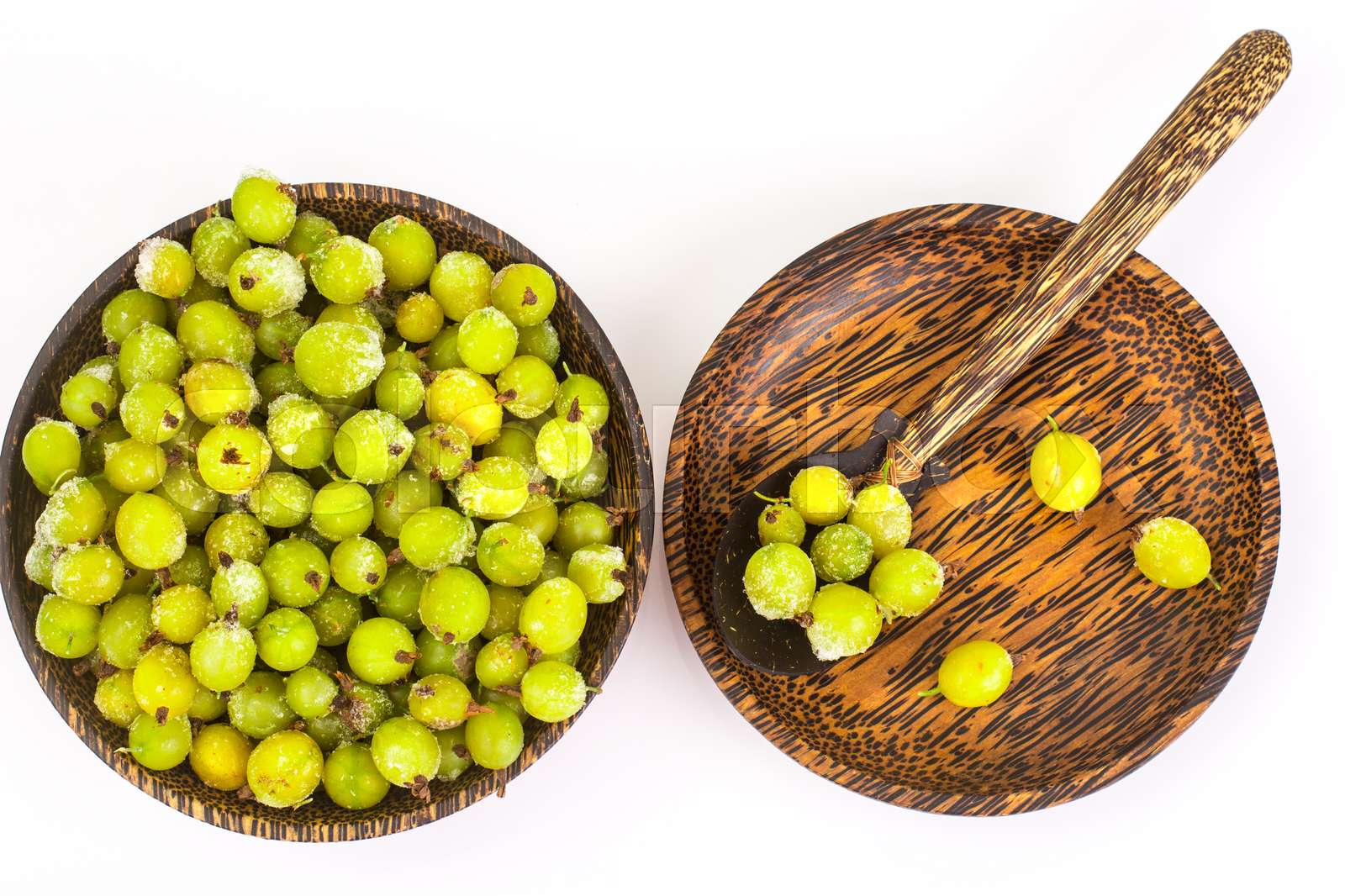 Frozen gooseberries on white | Stock image | Colourbox