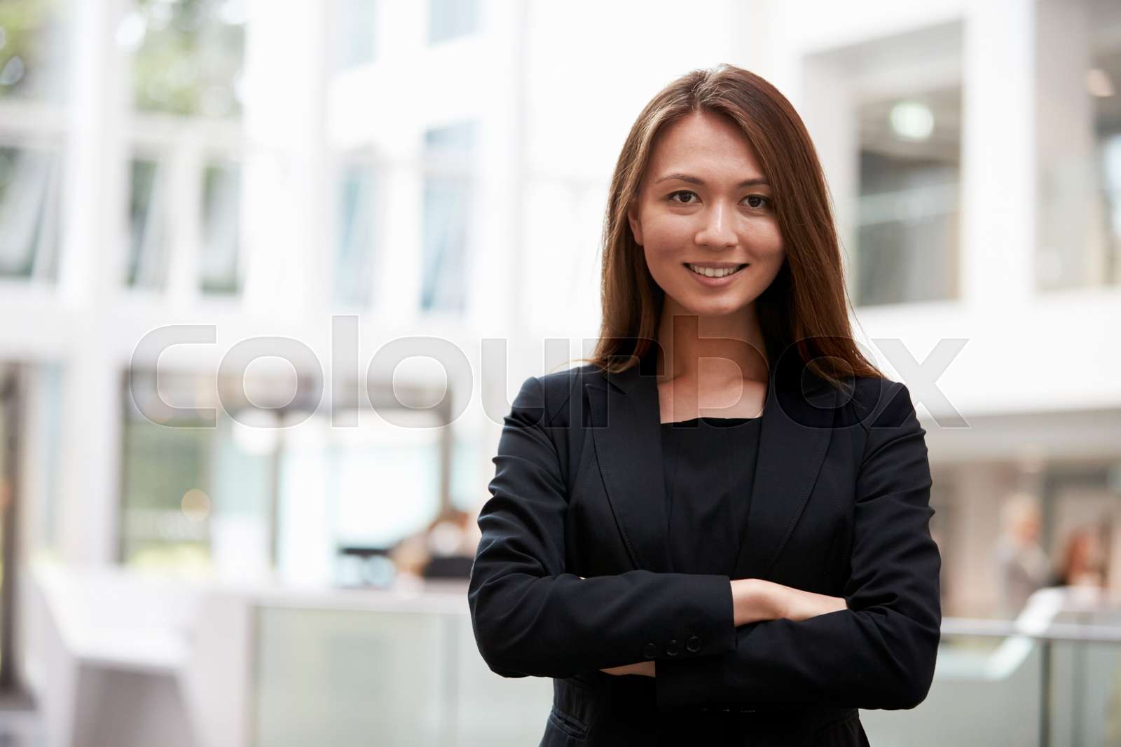 Head And Shoulders Portrait Of Young Businesswoman In Office | Stock ...