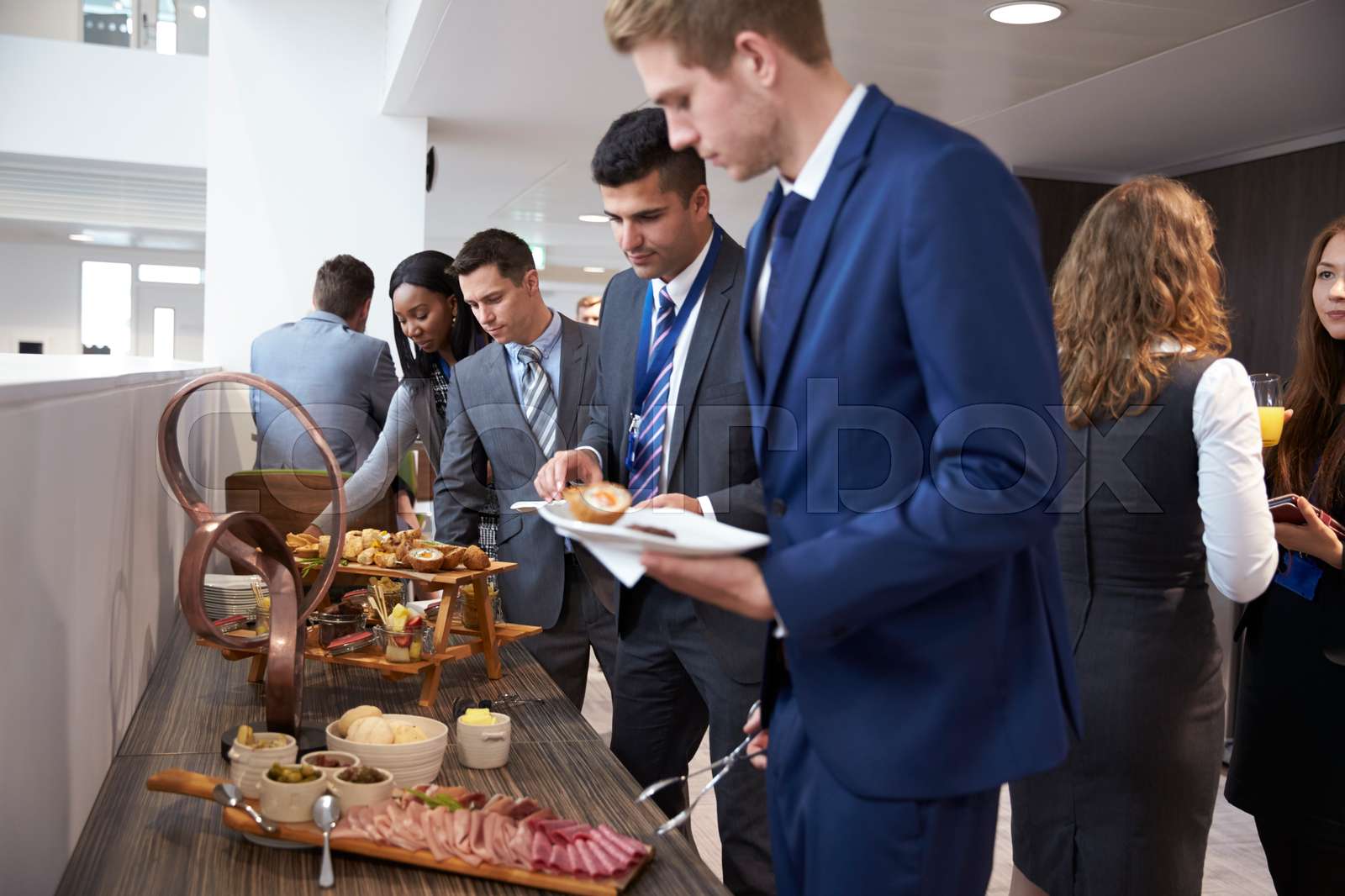 Delegates At Lunch Buffet During Conference Break | Stock image | Colourbox