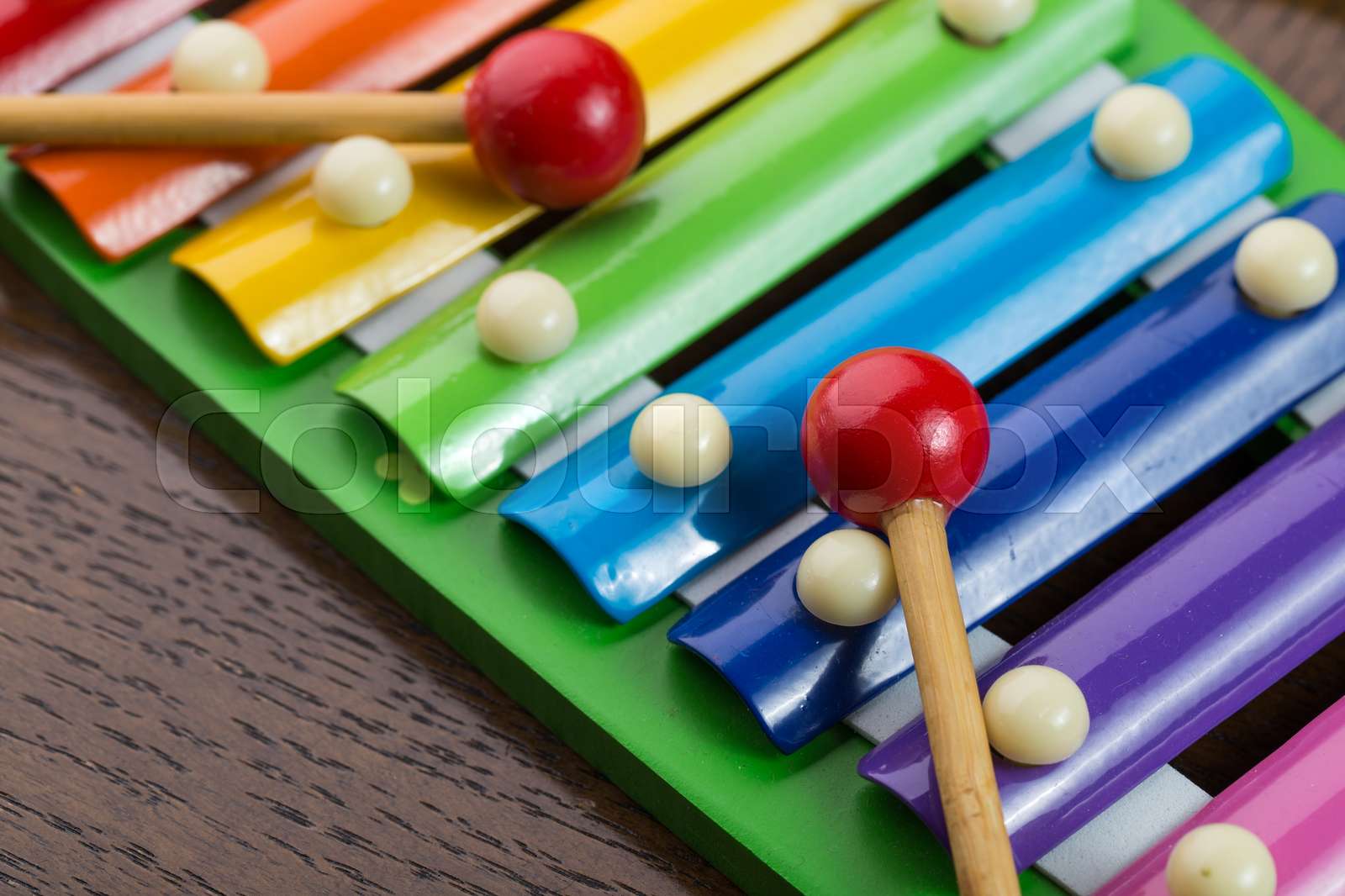 Rainbow colored toy xylophone | Stock image | Colourbox