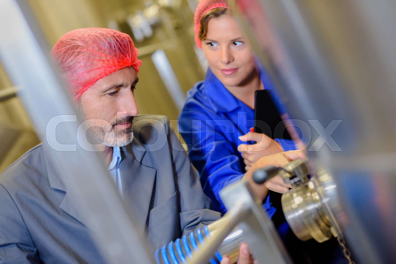 working in a factory | Stock image | Colourbox