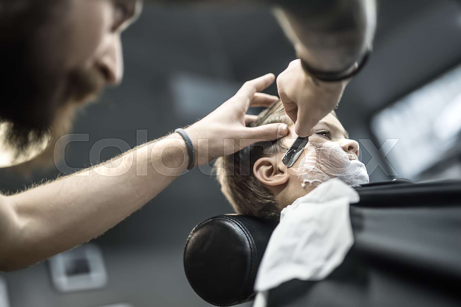 Funny shaving of little boy | Stock image | Colourbox