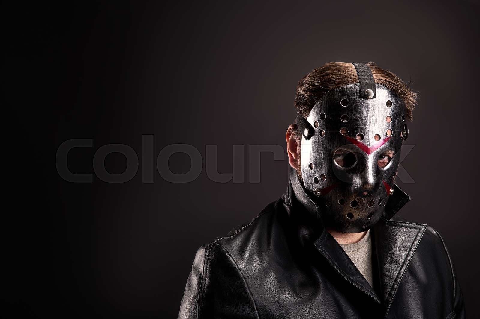 Bloody murderer in hockey mask portrait | Stock image | Colourbox
