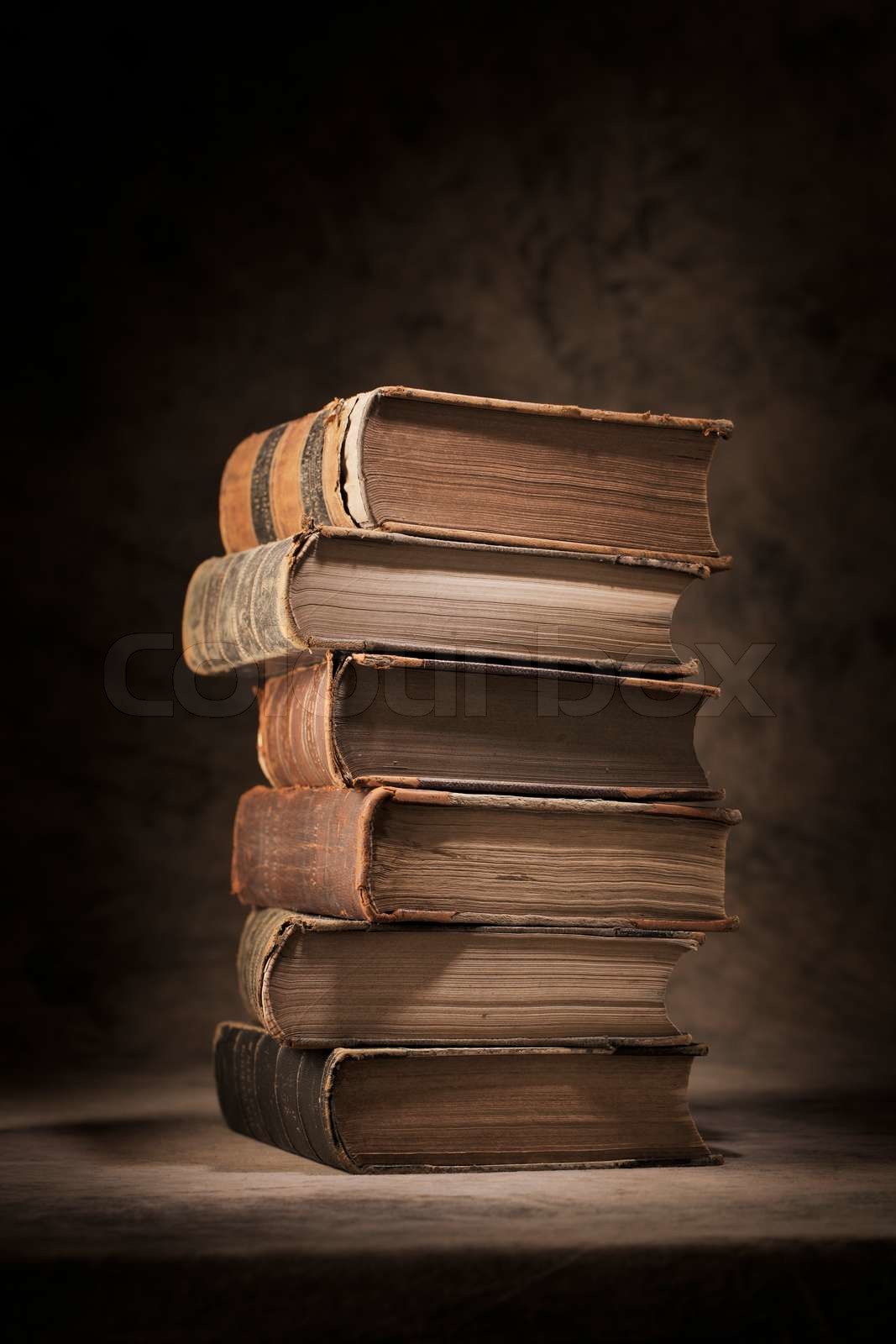 A Stack of old worn and tattered books | Stock image | Colourbox