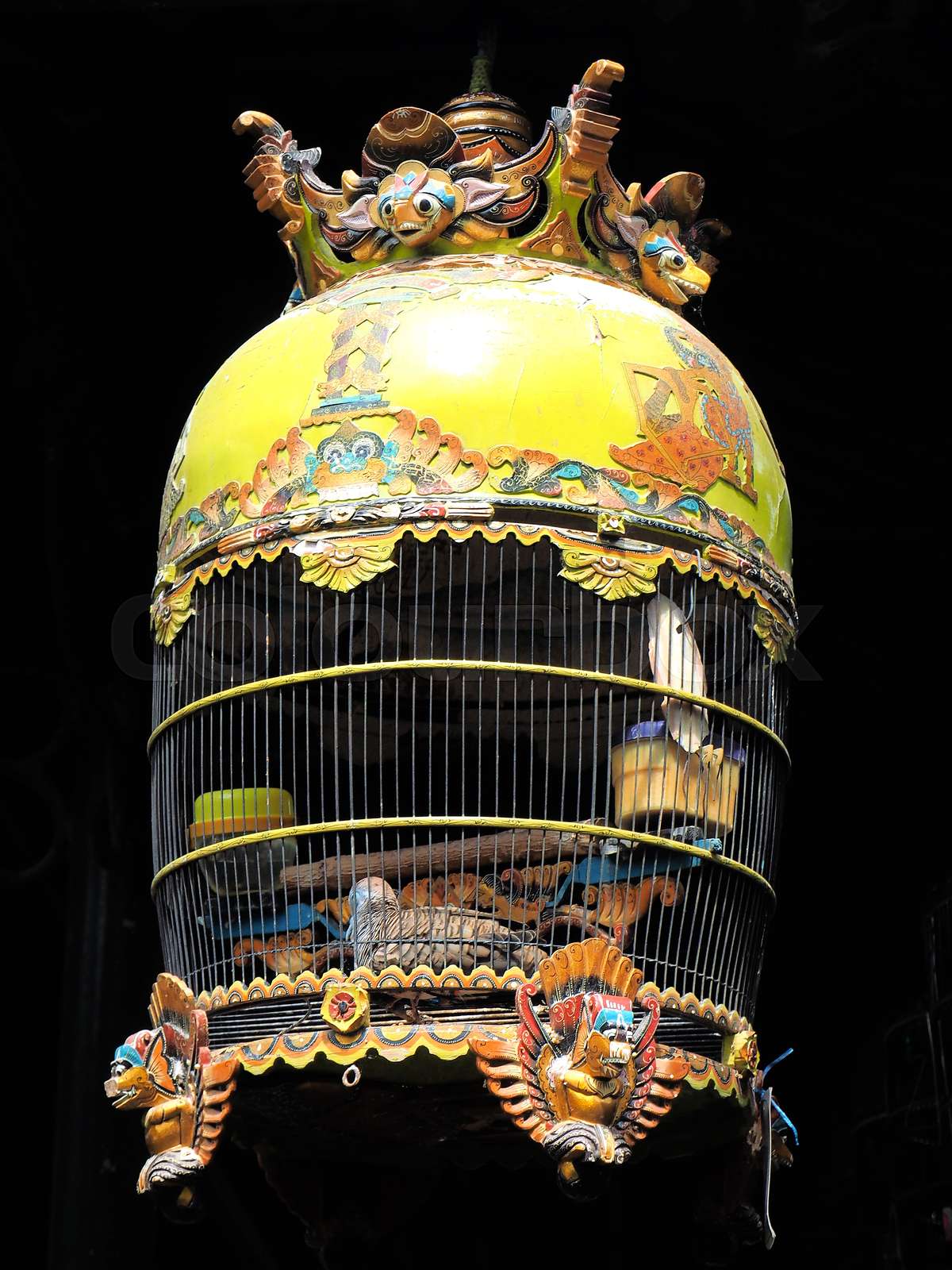 yellow bird cage | Stock image | Colourbox