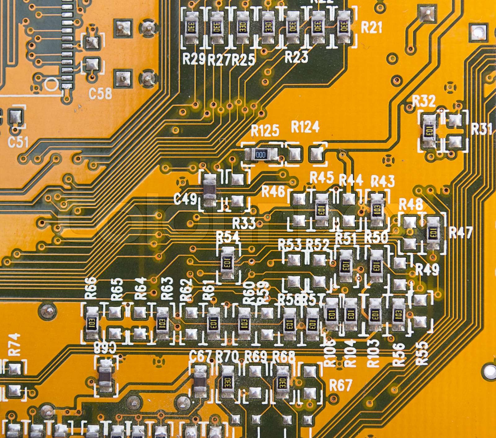 yellow circuit board with components | Stock image | Colourbox