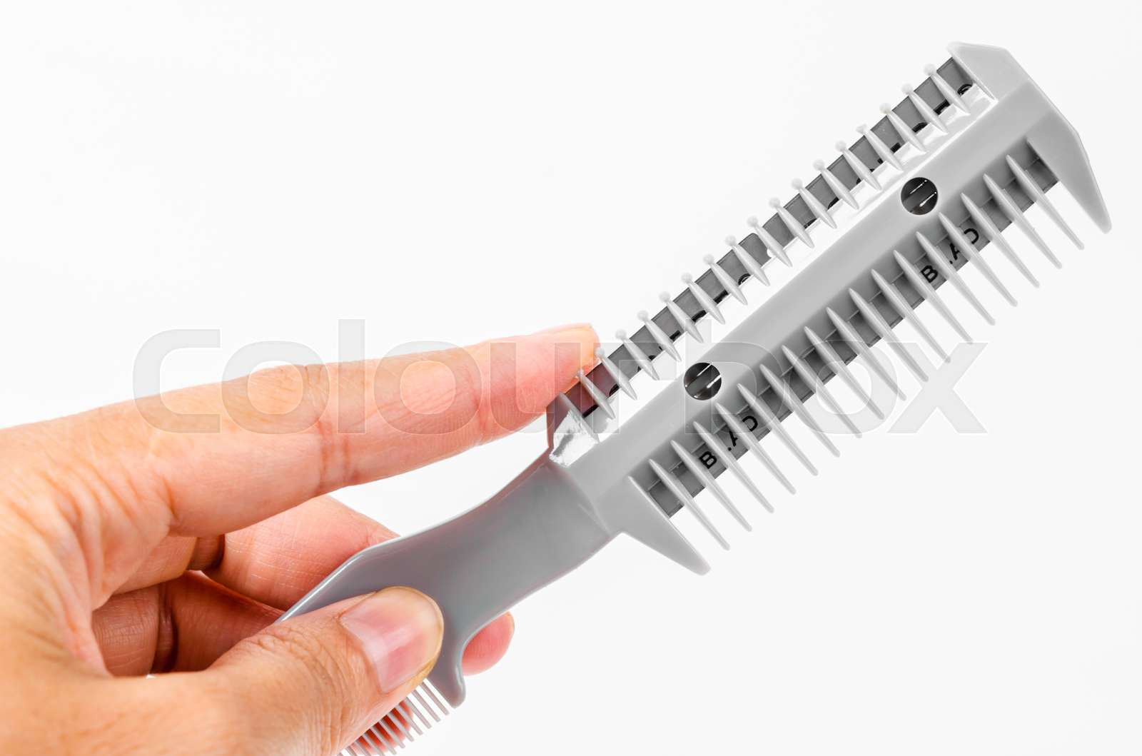 Comb slice hair. | Stock image | Colourbox