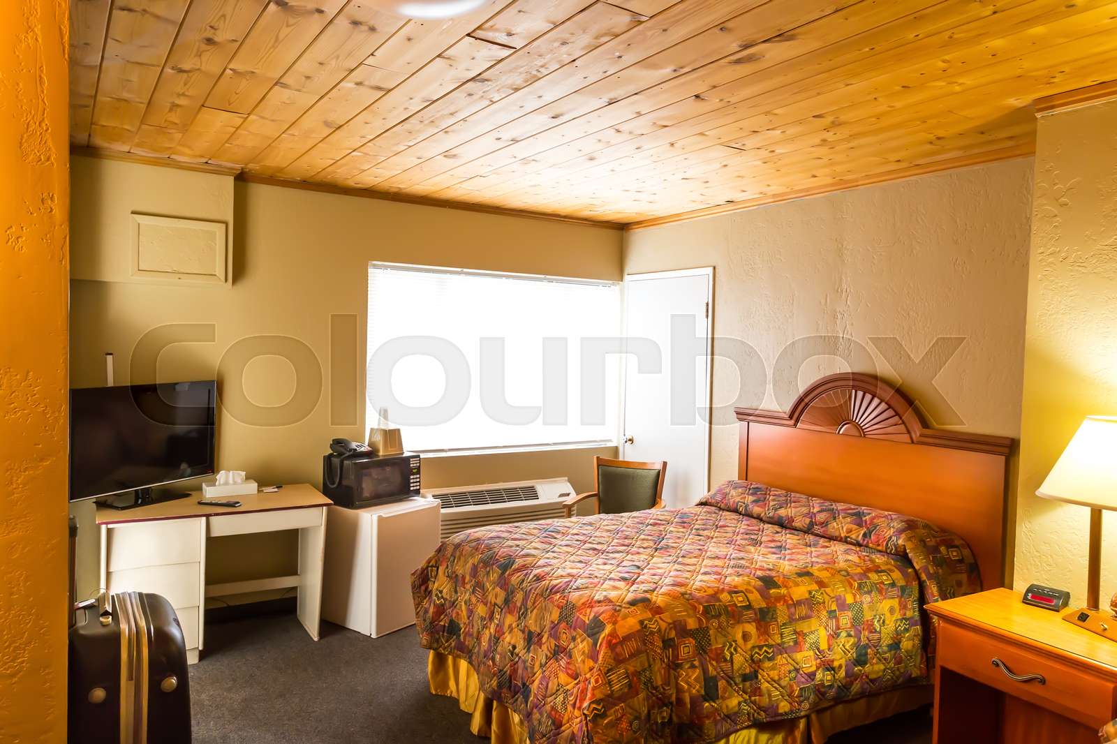 Road motel room interior. | Stock image | Colourbox