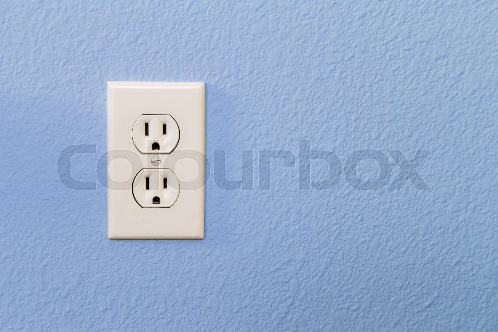 Electrical Sockets In Colorful Blue Wall | Stock image | Colourbox