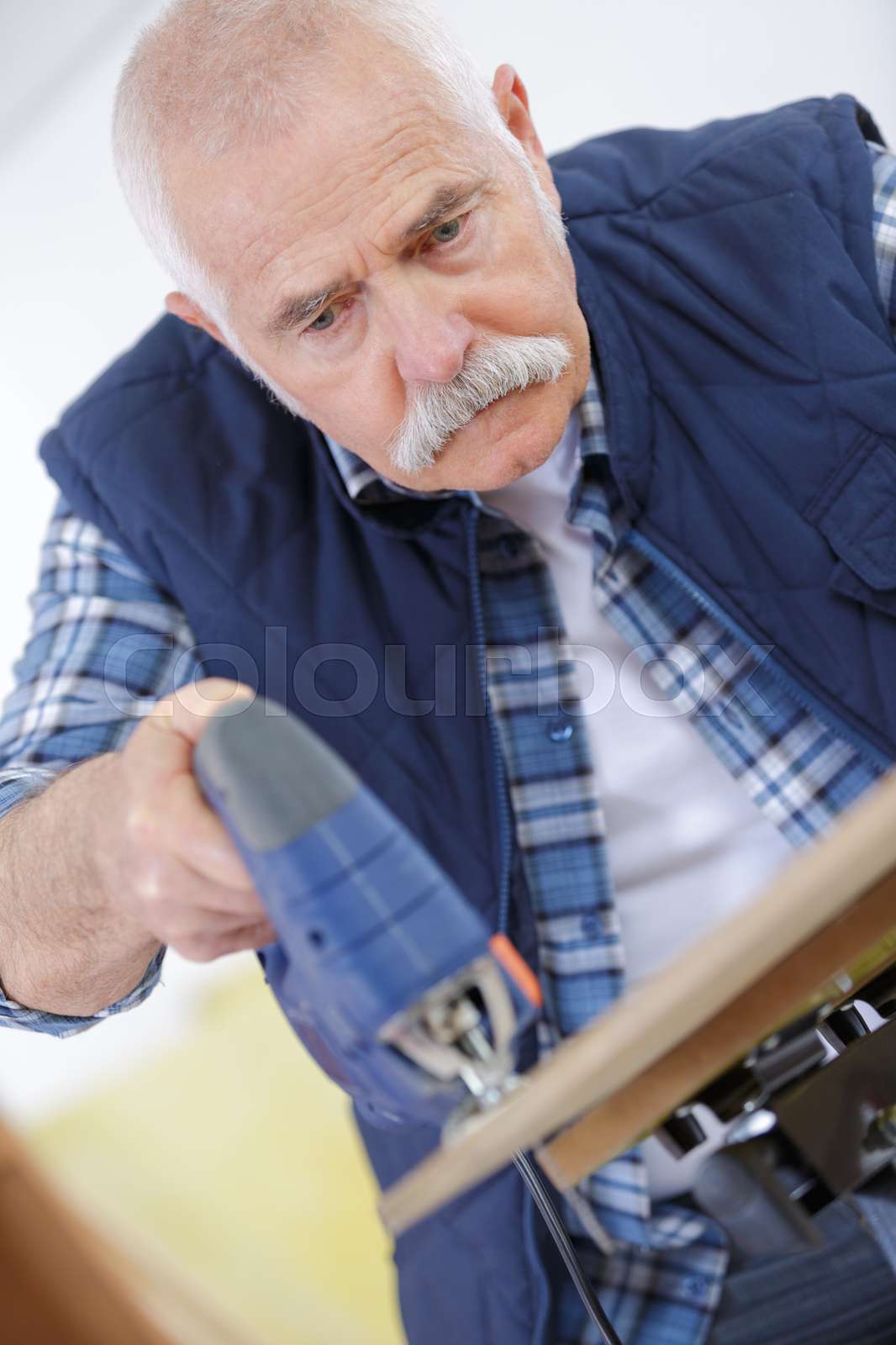 using a jigsaw | Stock image | Colourbox