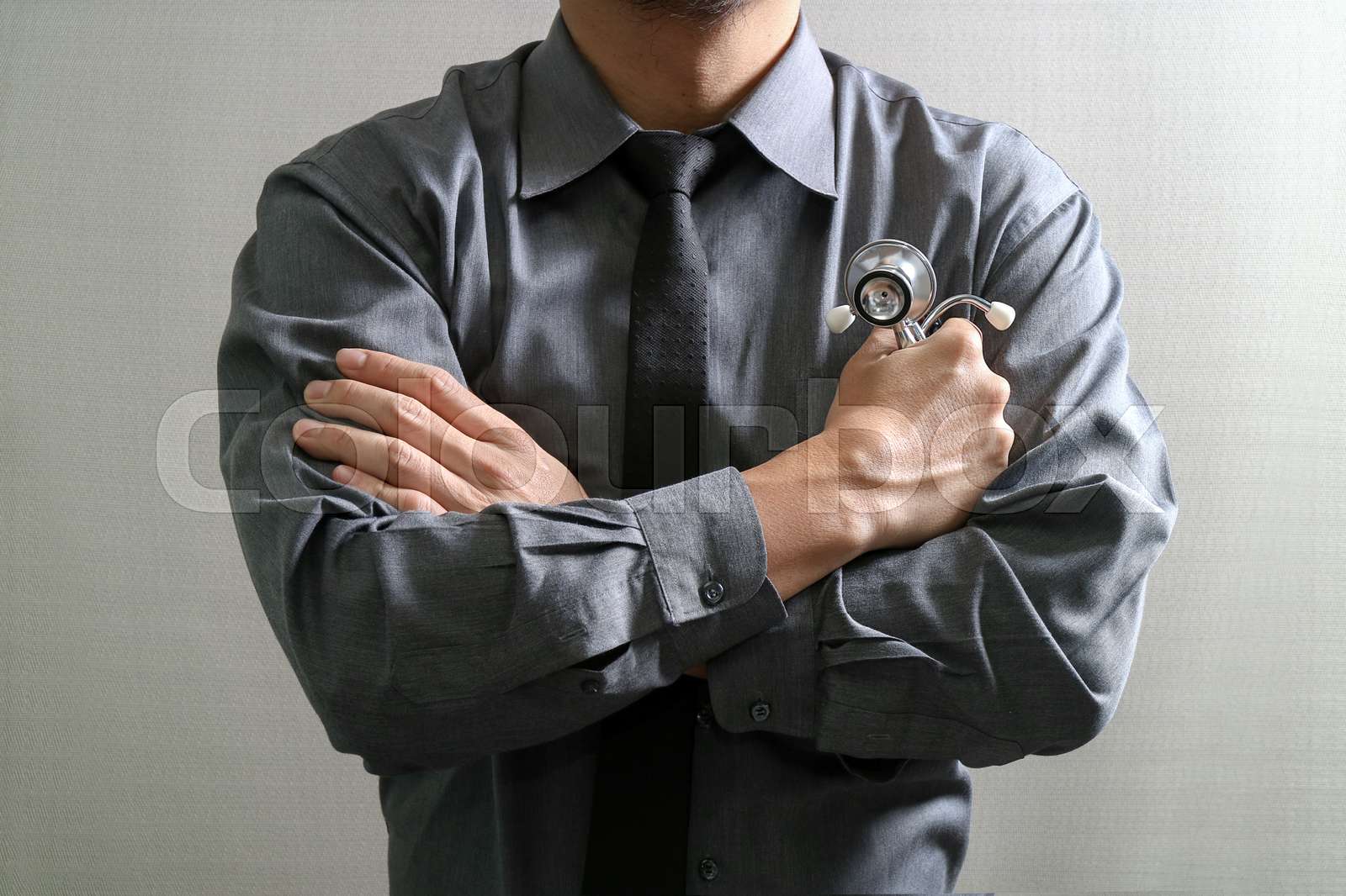 smart medical doctor across his arms, touch screen computer,stethoscope ...