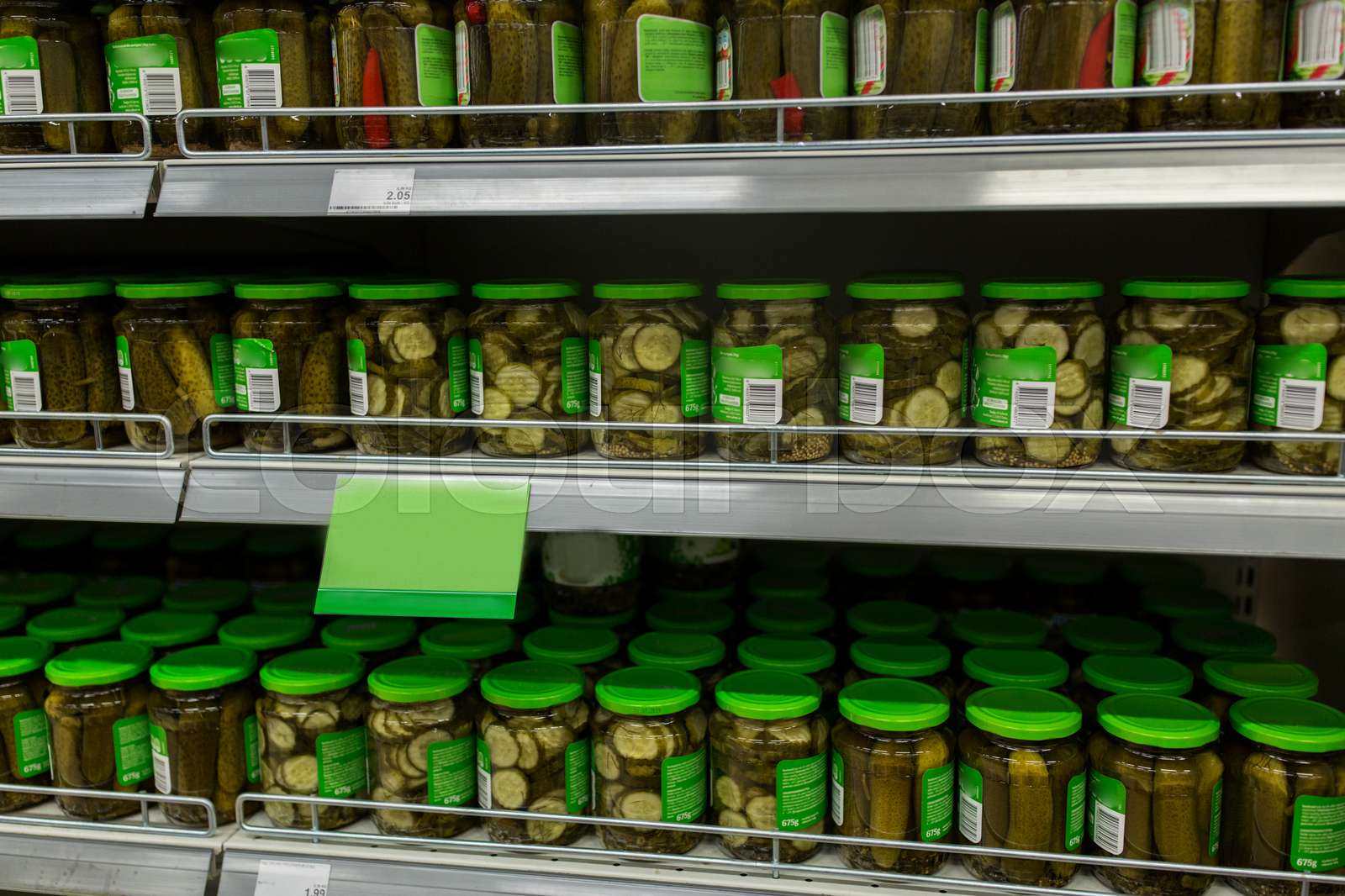 jars of pickles on grocery or supermarket shelves | Stock image | Colourbox
