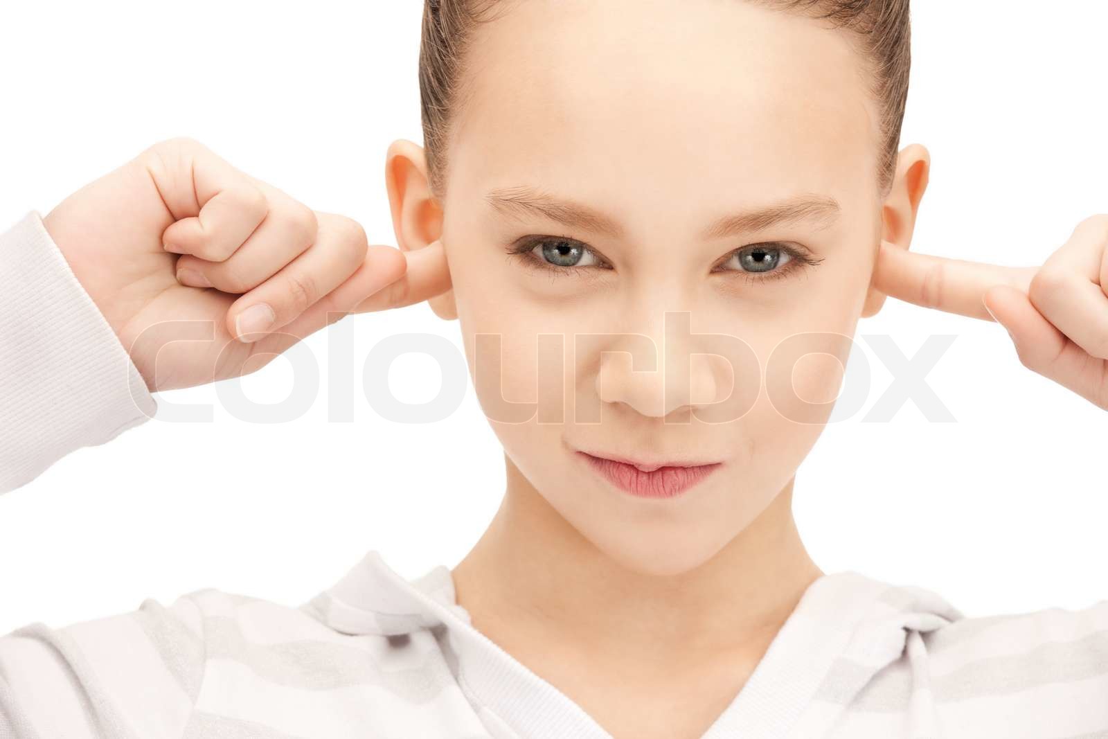 picture of teenage girl with fingers in ears | Stock image | Colourbox