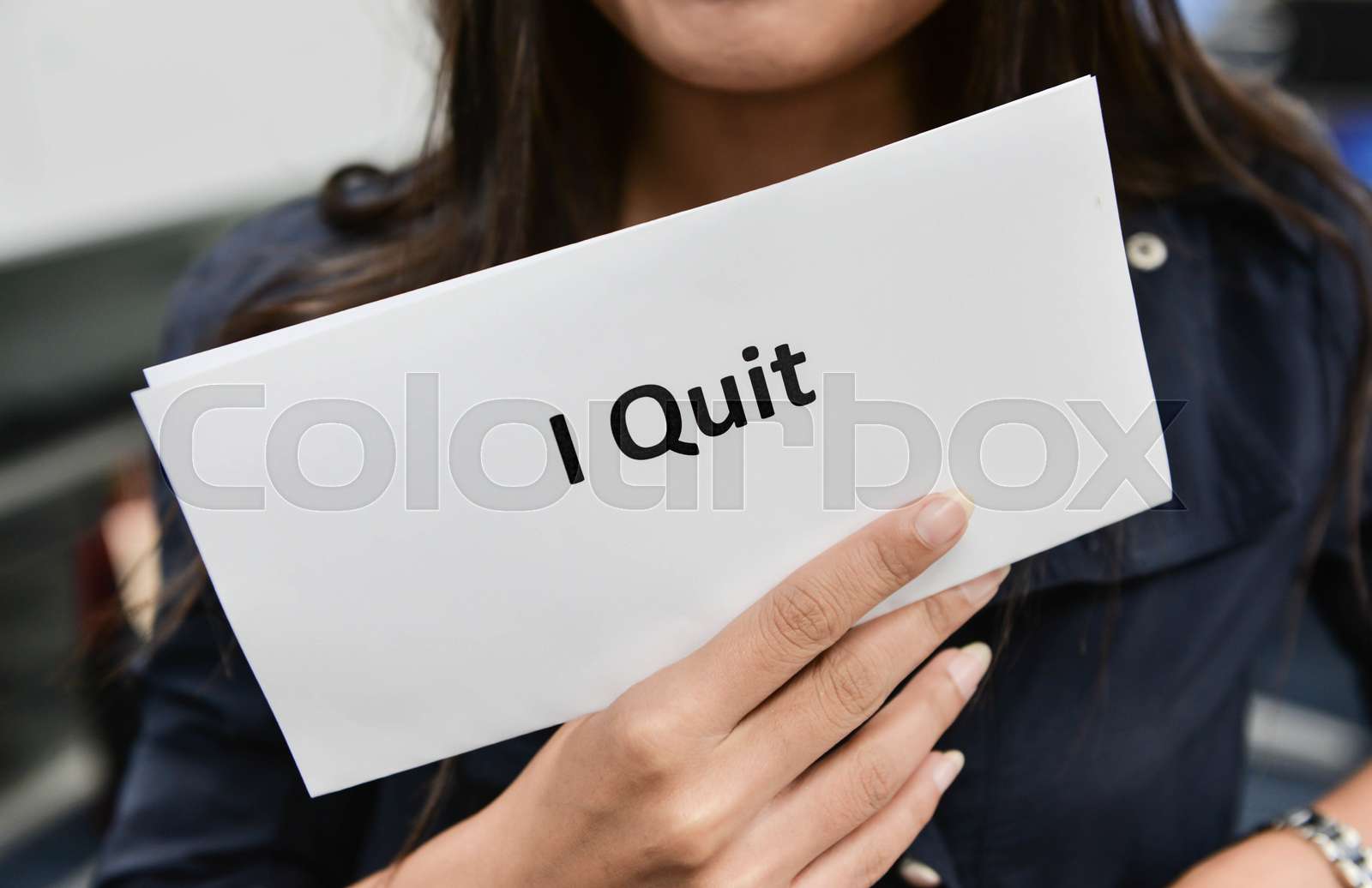 I Quit - Business woman is showing the document for resignation for ...