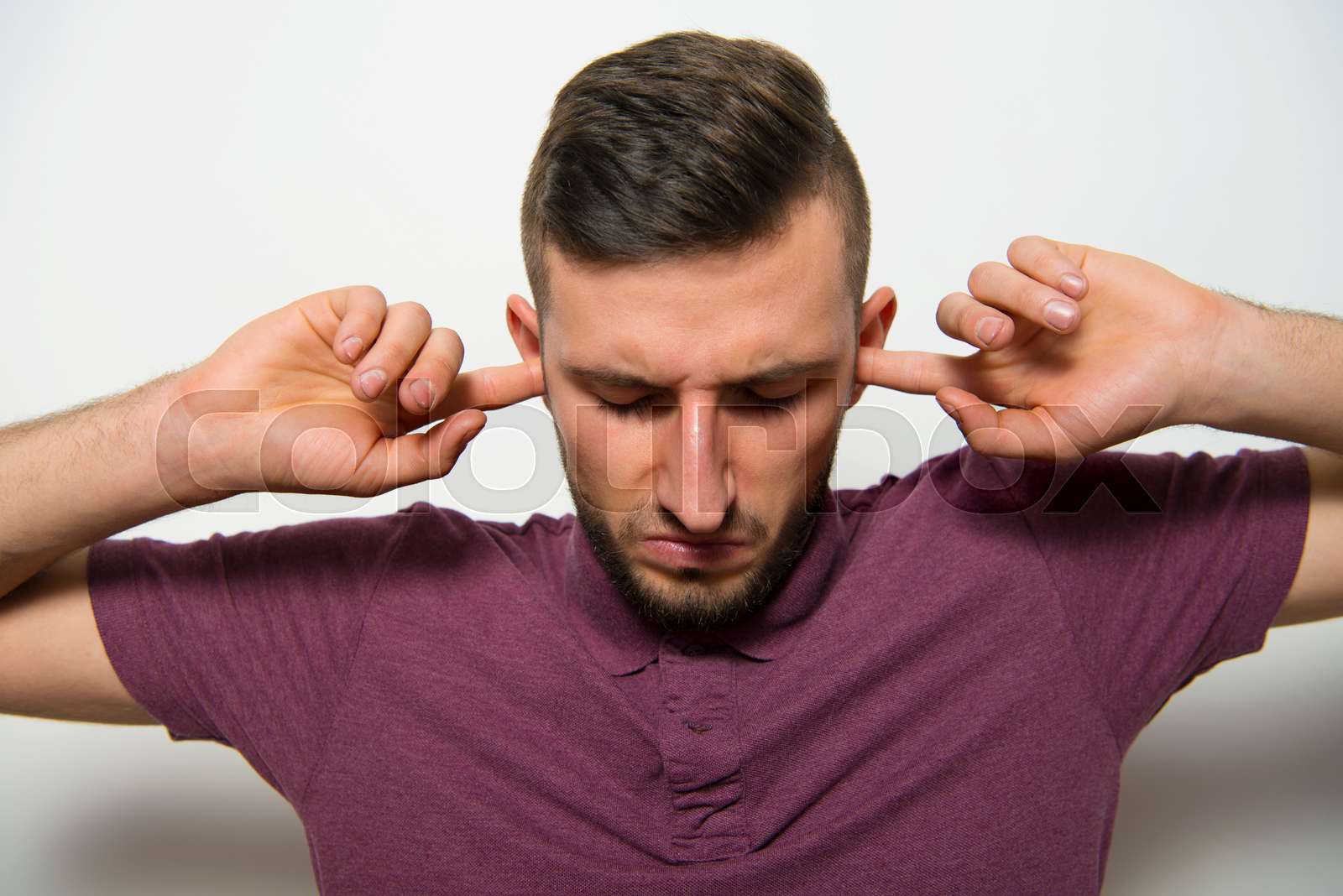 Close ears man | Stock image | Colourbox