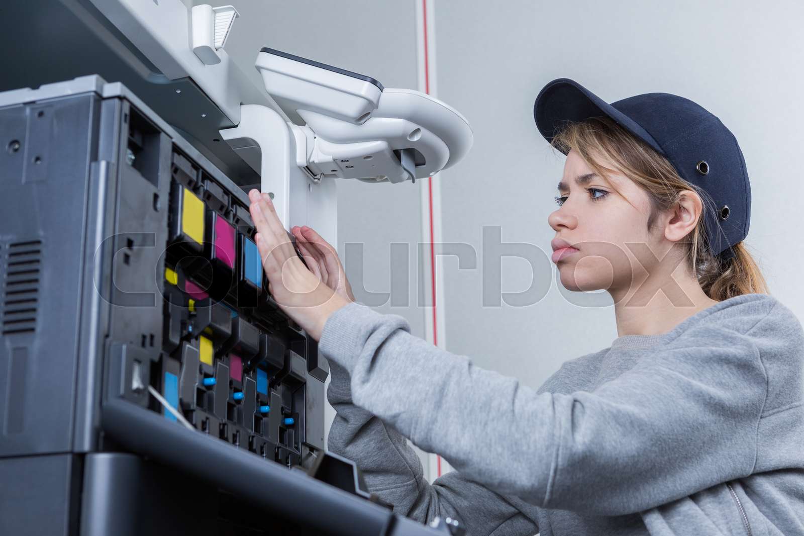 checking the printer | Stock image | Colourbox