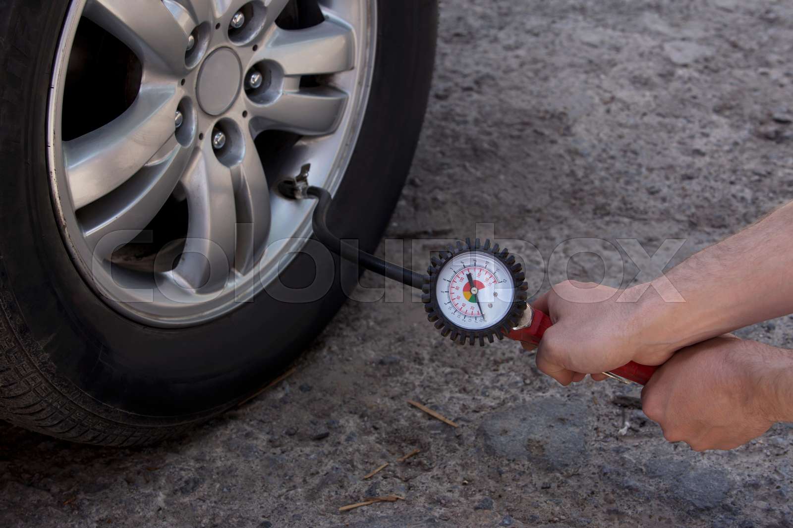 inflating the wheels | Stock image | Colourbox