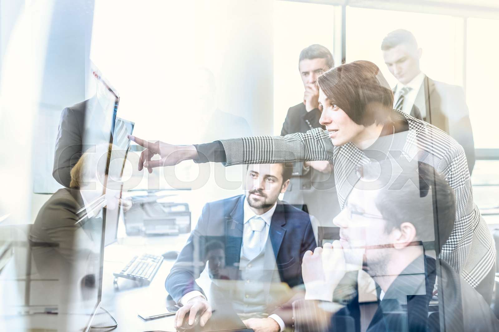 Business team working in corporate office. | Stock image | Colourbox
