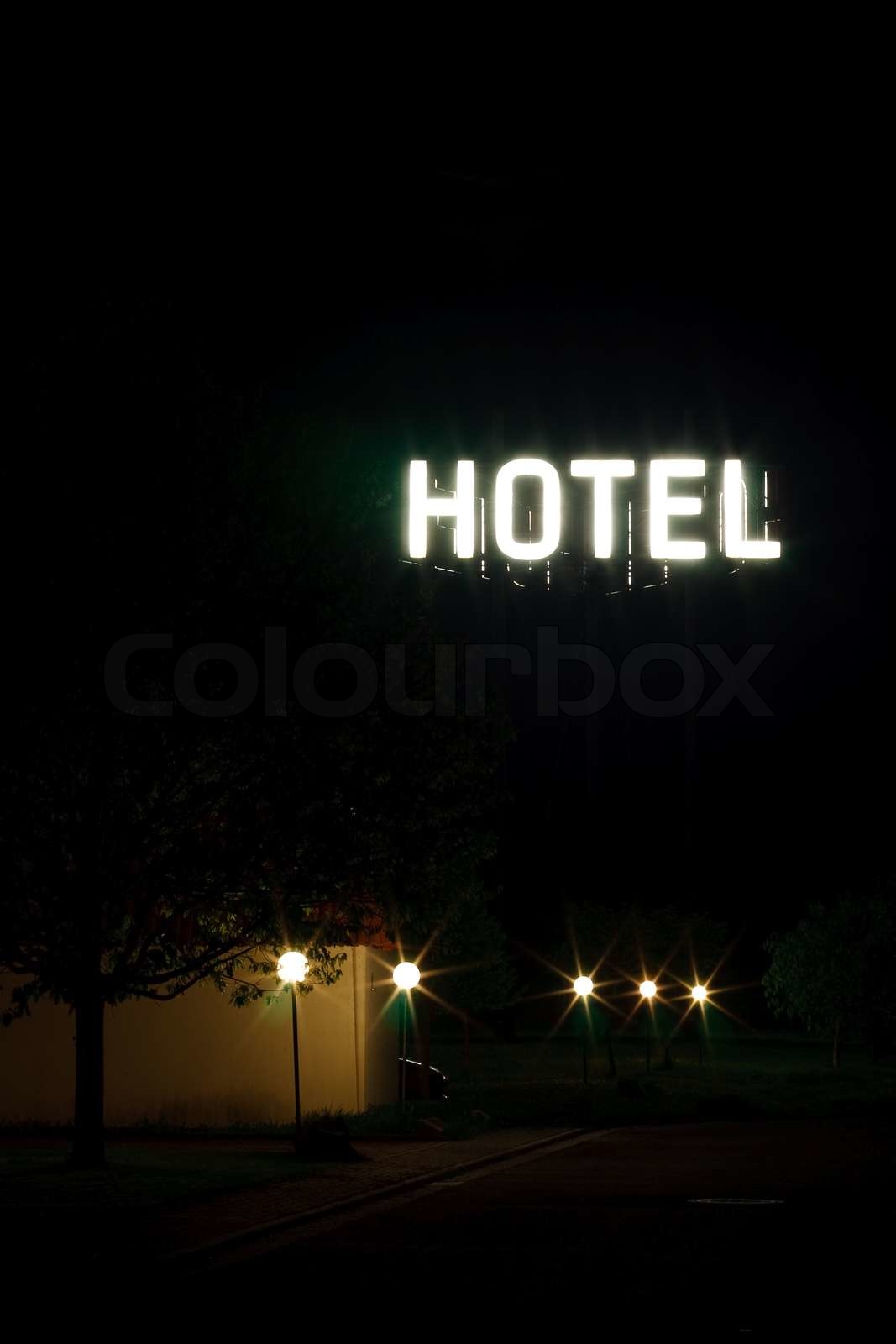 Illuminated signboard hotel | Stock image | Colourbox