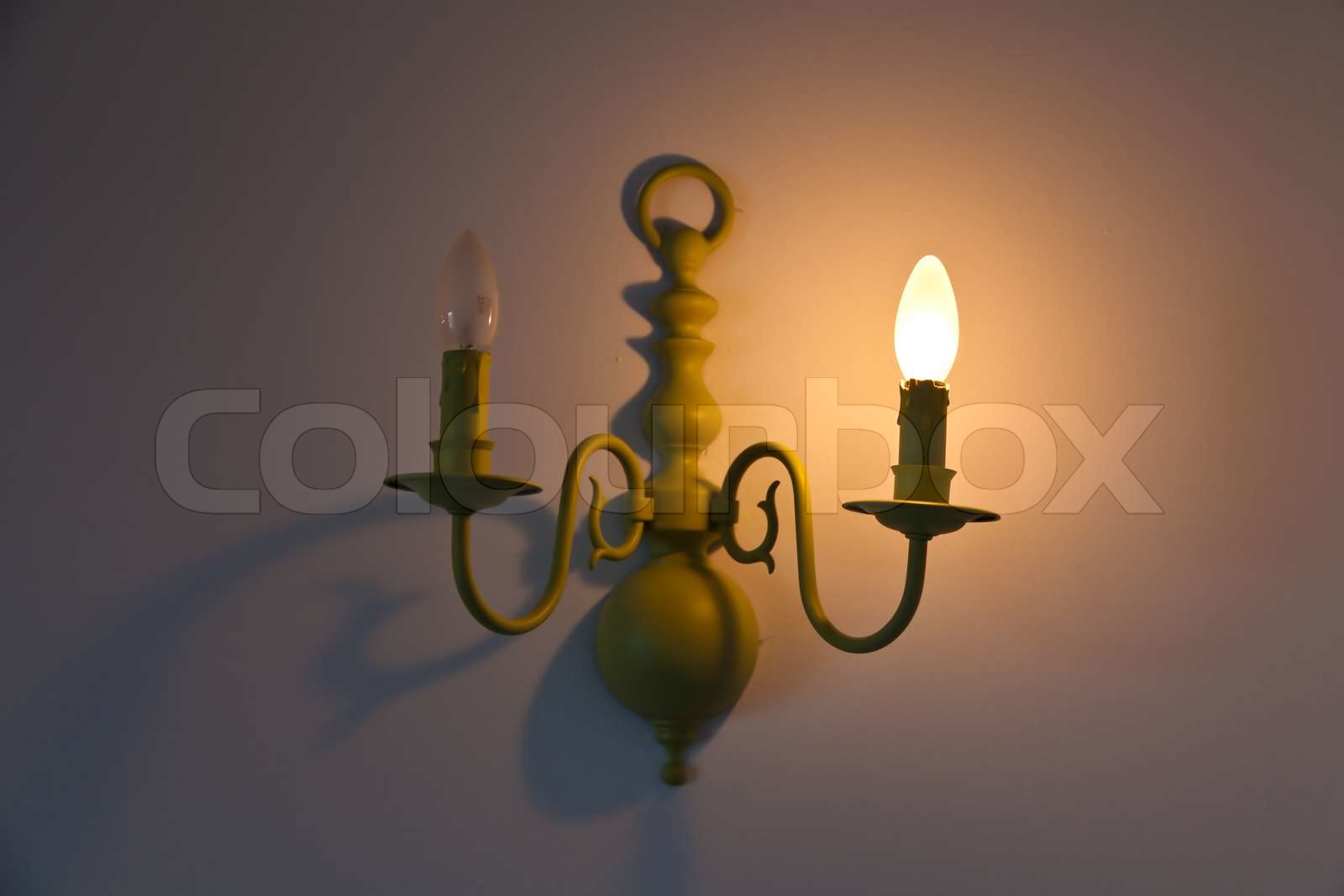 A defective light bulb in a lighting in a room | Stock image | Colourbox