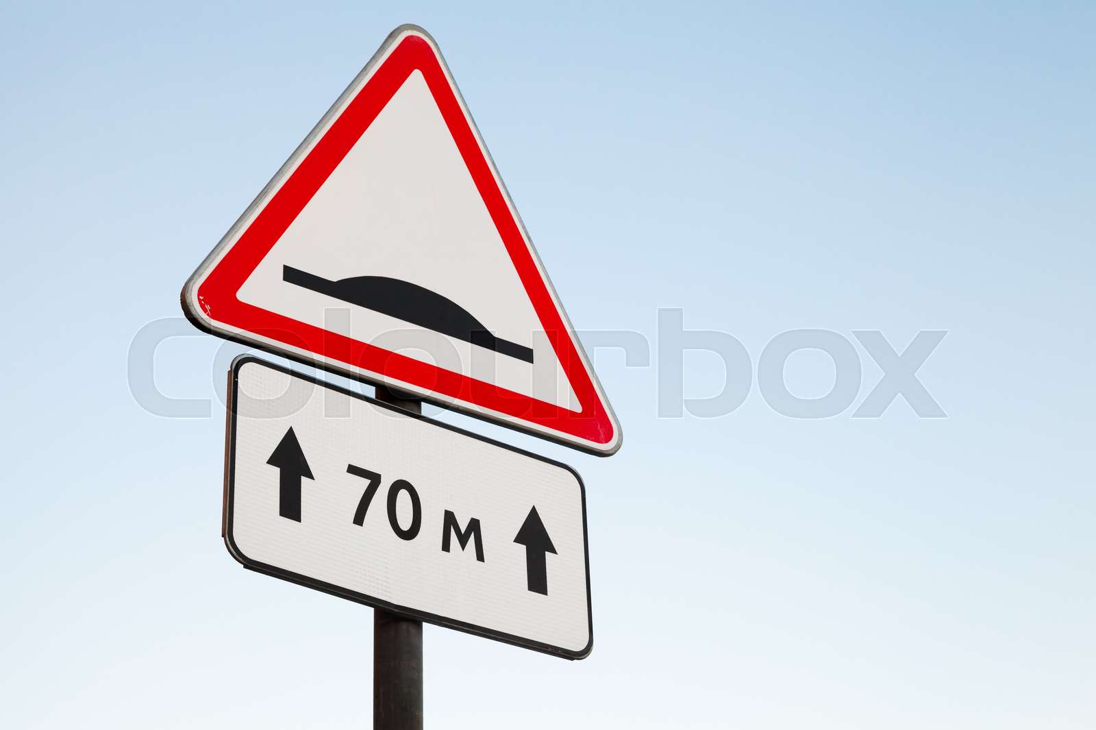 Speed Bump. Warning road sign | Stock image | Colourbox
