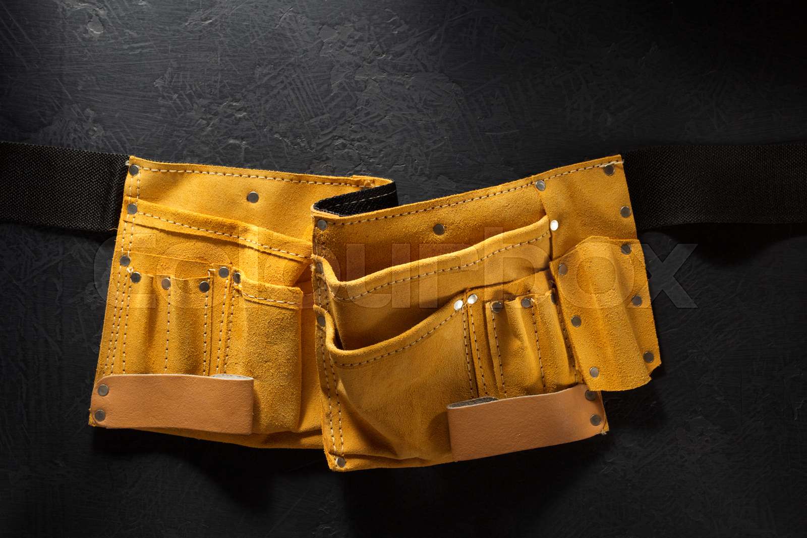 tool belt on black | Stock image | Colourbox