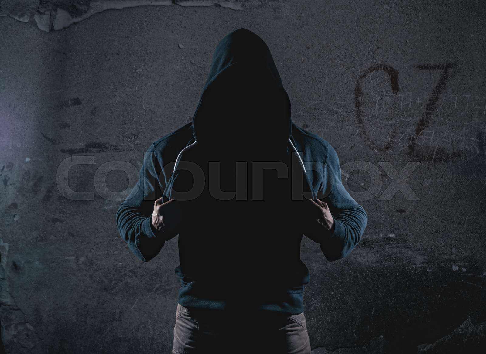 Anonymous man with hooded sweater | Stock image | Colourbox