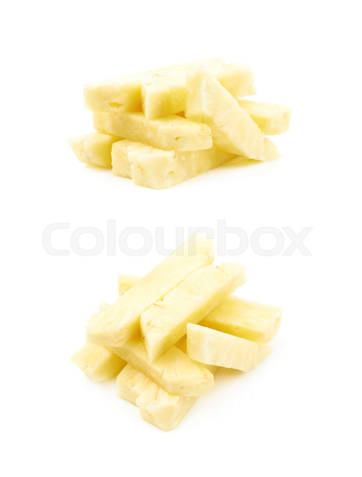 Pile of pineapple bits isolated | Stock image | Colourbox