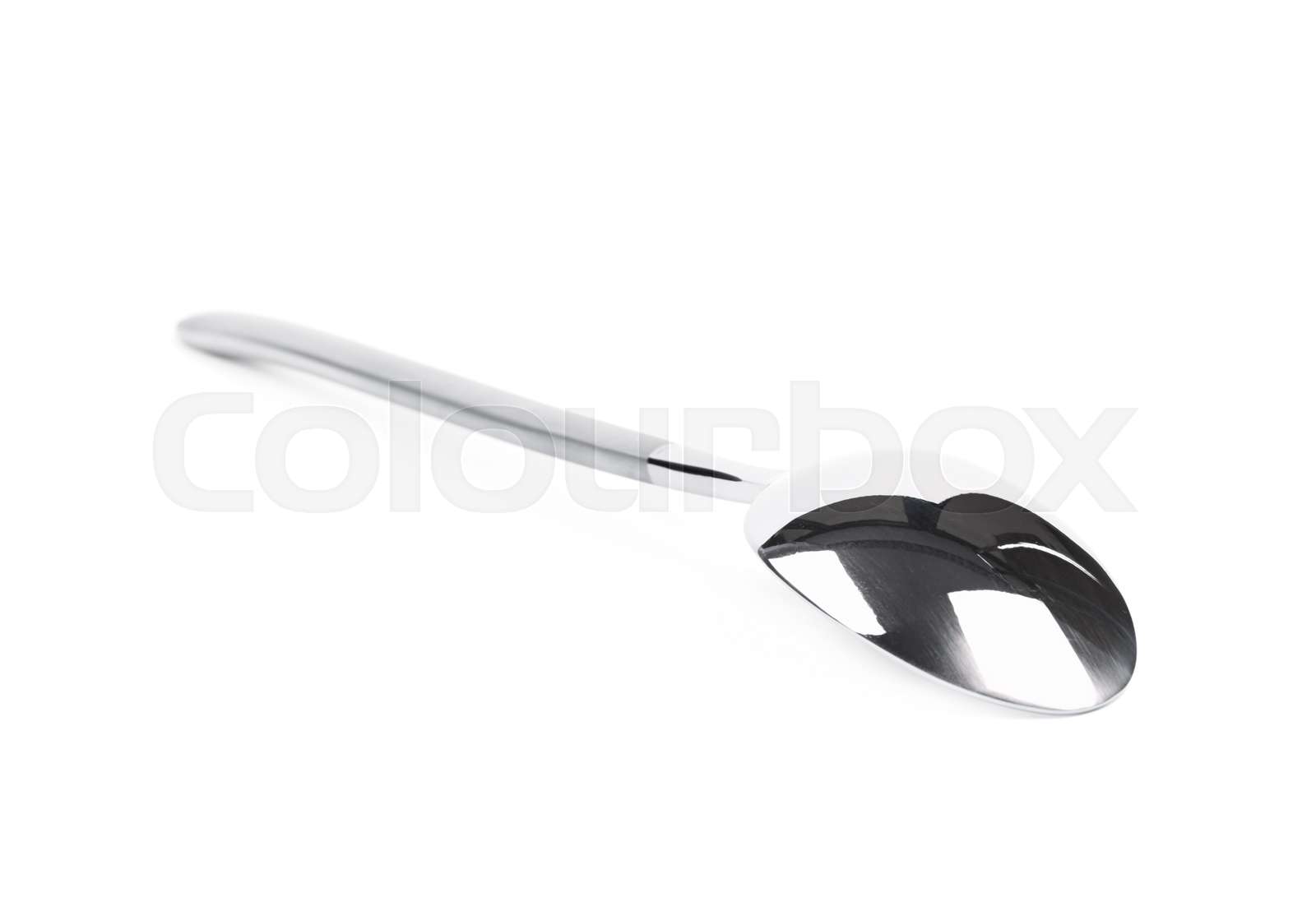 Metal teaspoon isolated | Stock image | Colourbox