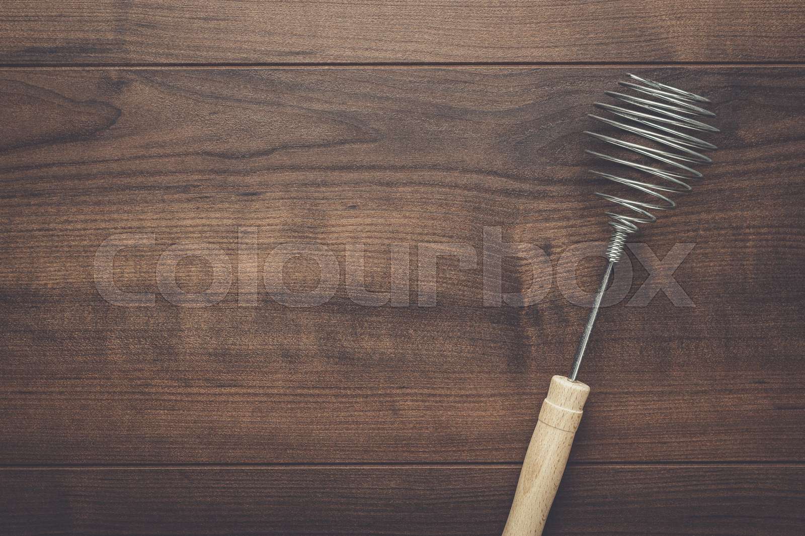 retro egg whisk with wooden handle | Stock image | Colourbox