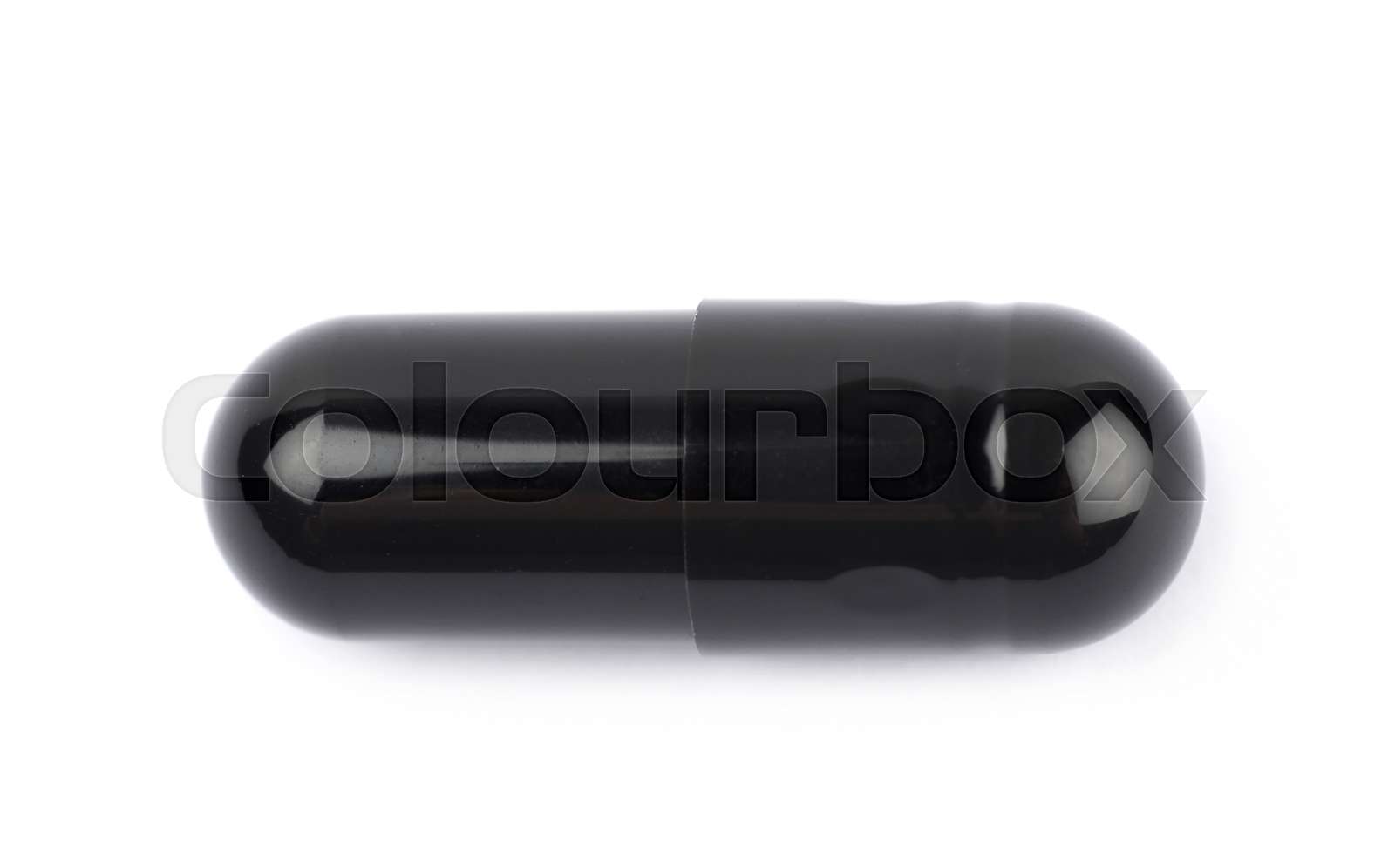 Single softgel capsule pill isolated | Stock image | Colourbox