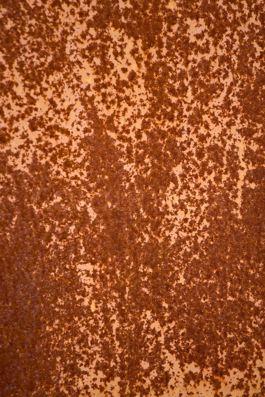 A rusted metal texture with an orange tone | Stock image | Colourbox