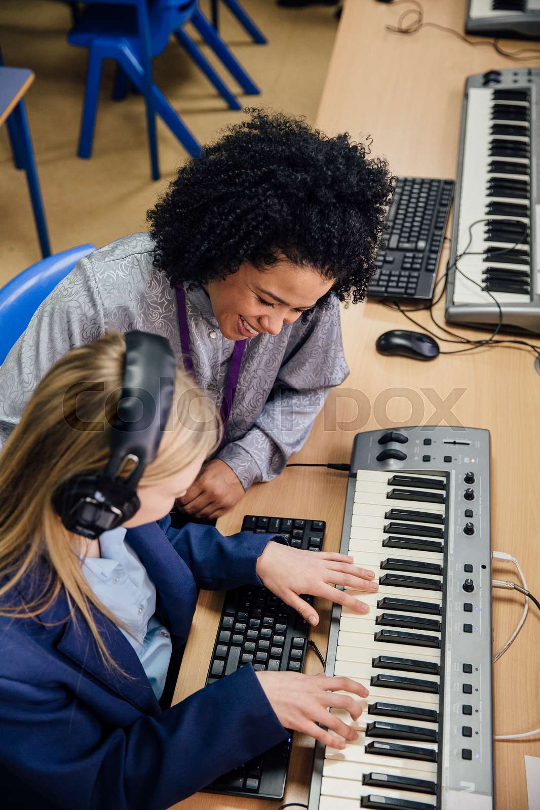 Learning Keyboard In Music Lesson | Stock image | Colourbox