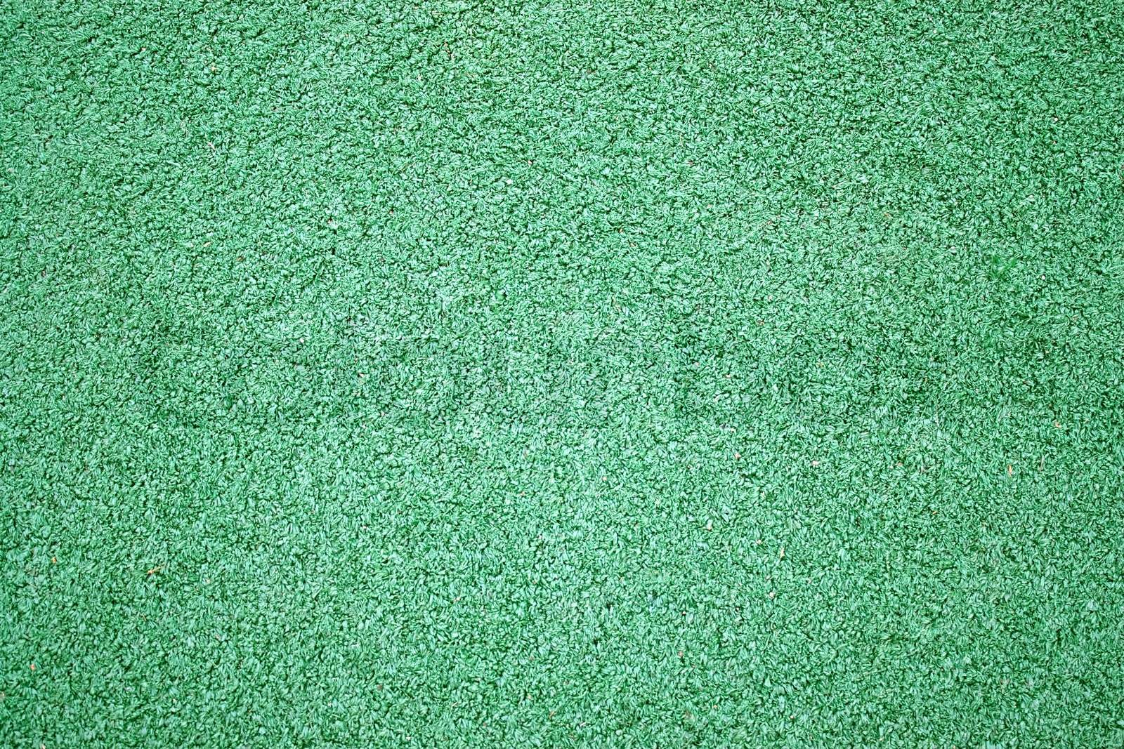 A green artificial astro turf texture commonly used in ball sports ...