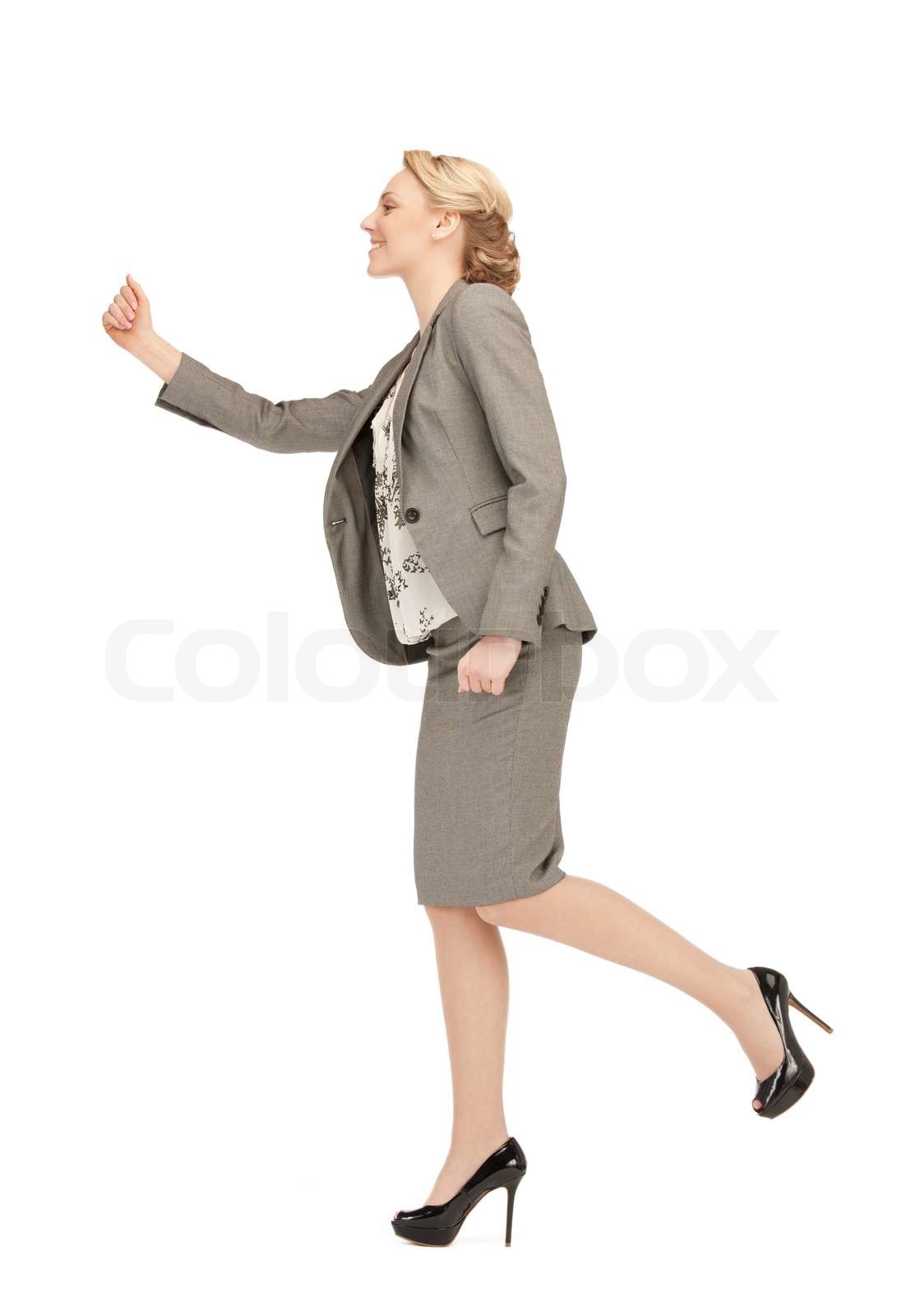 bright picture of happy and smiling walking woman | Stock image | Colourbox