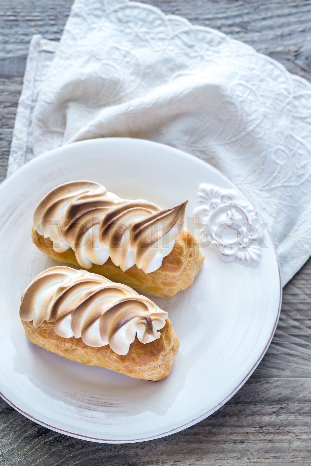 Eclairs with lemon curd and meringue | Stock image | Colourbox