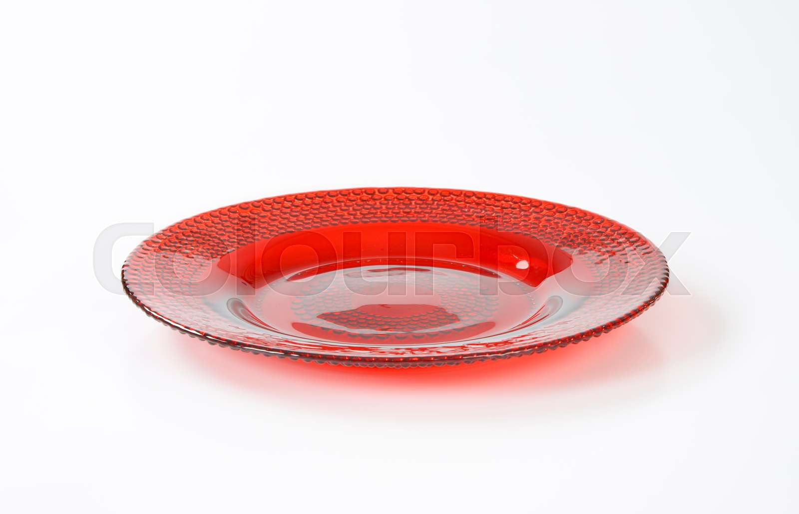 Red glass plate | Stock image | Colourbox
