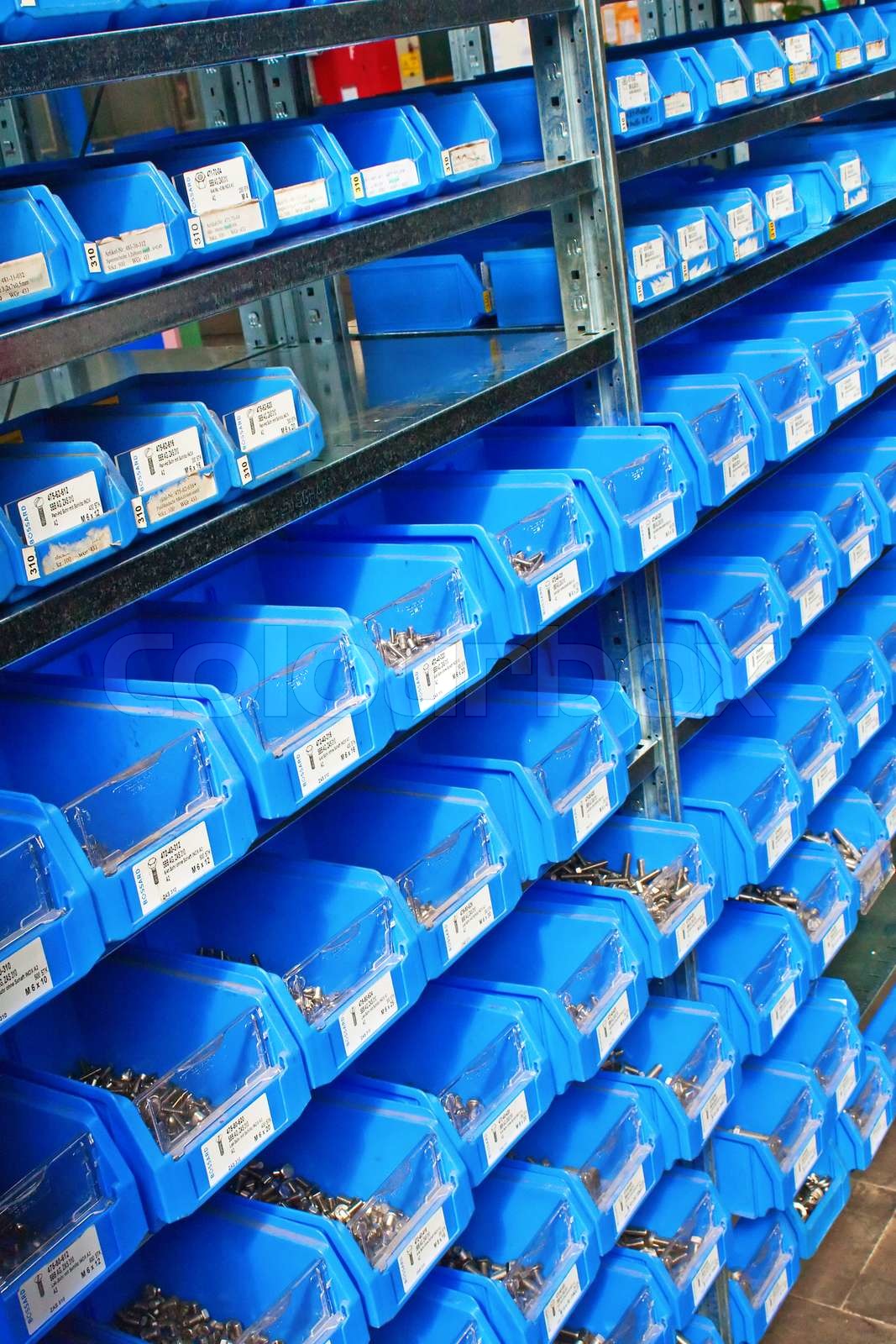Big blue fasteners storage system | Stock image | Colourbox