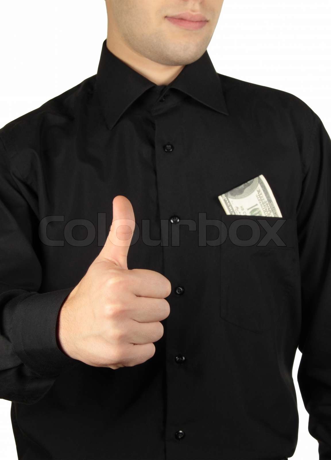 Forretningsmand med penge på lommen Viser ok tegn | Stock foto | Colourbox