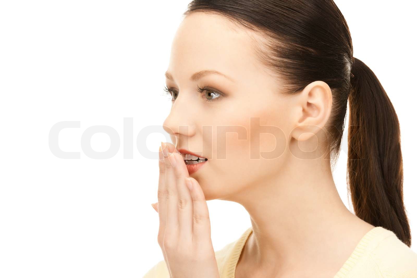 bright picture of pretty woman with hand over mouth | Stock image ...