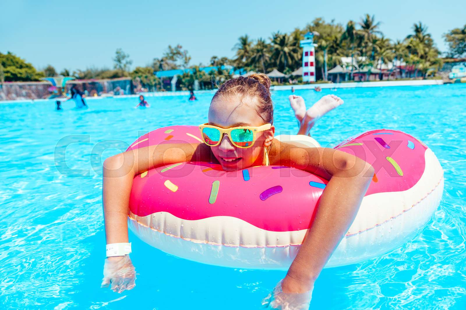 Tween girl in water park | Stock image | Colourbox