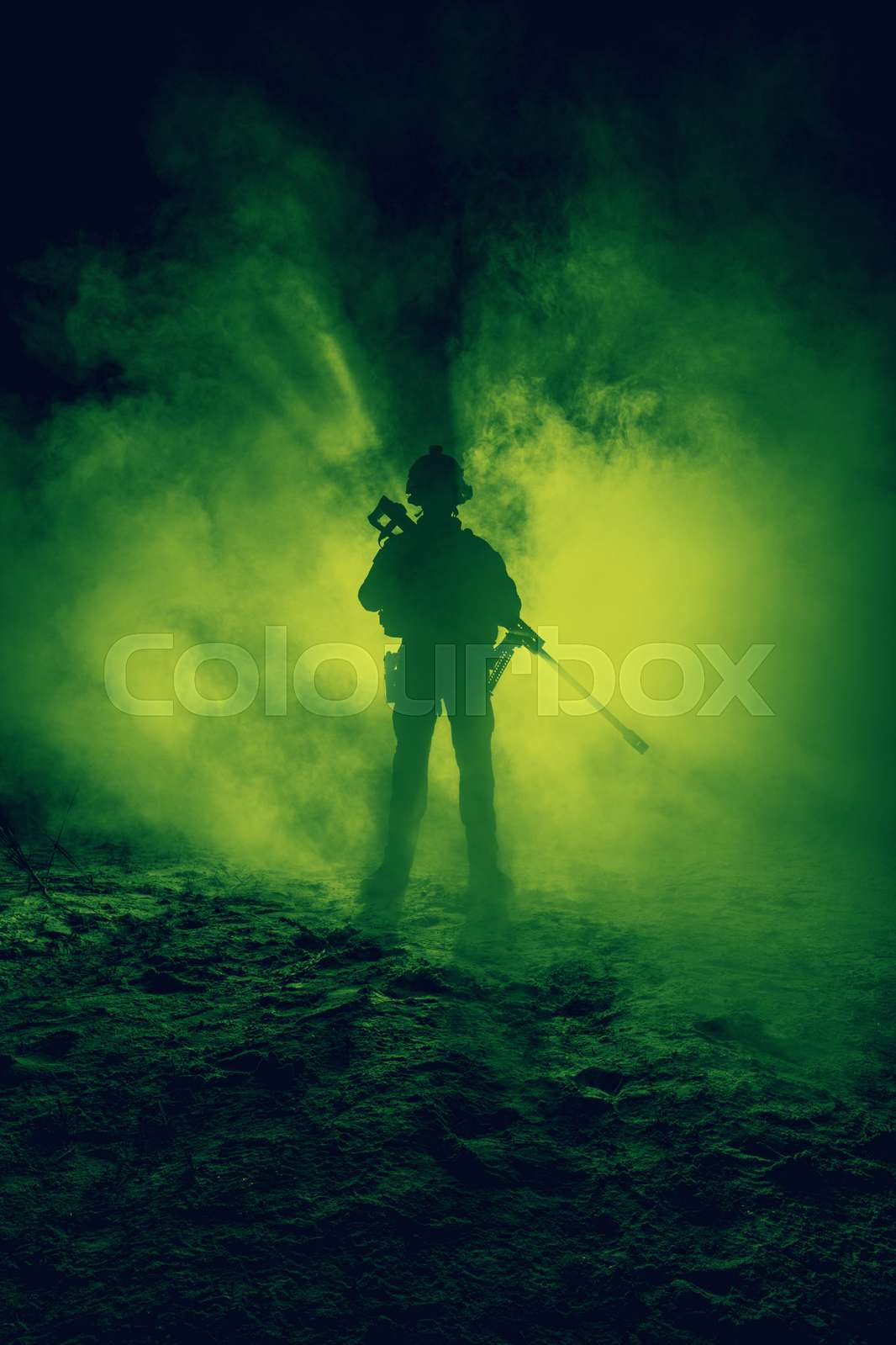 Army sniper in the fire and smoke | Stock image | Colourbox