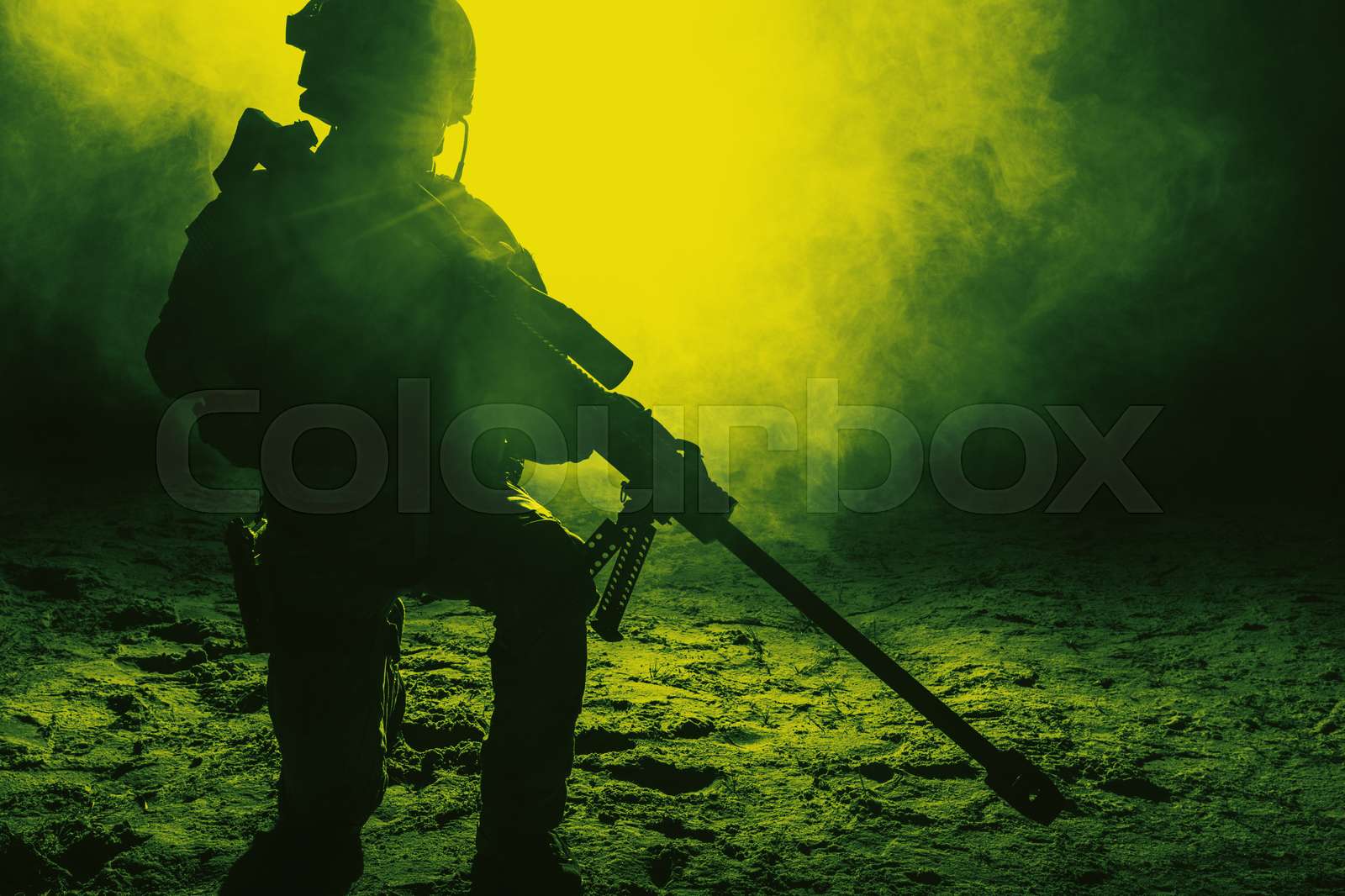 Army sniper in the fire and smoke | Stock image | Colourbox