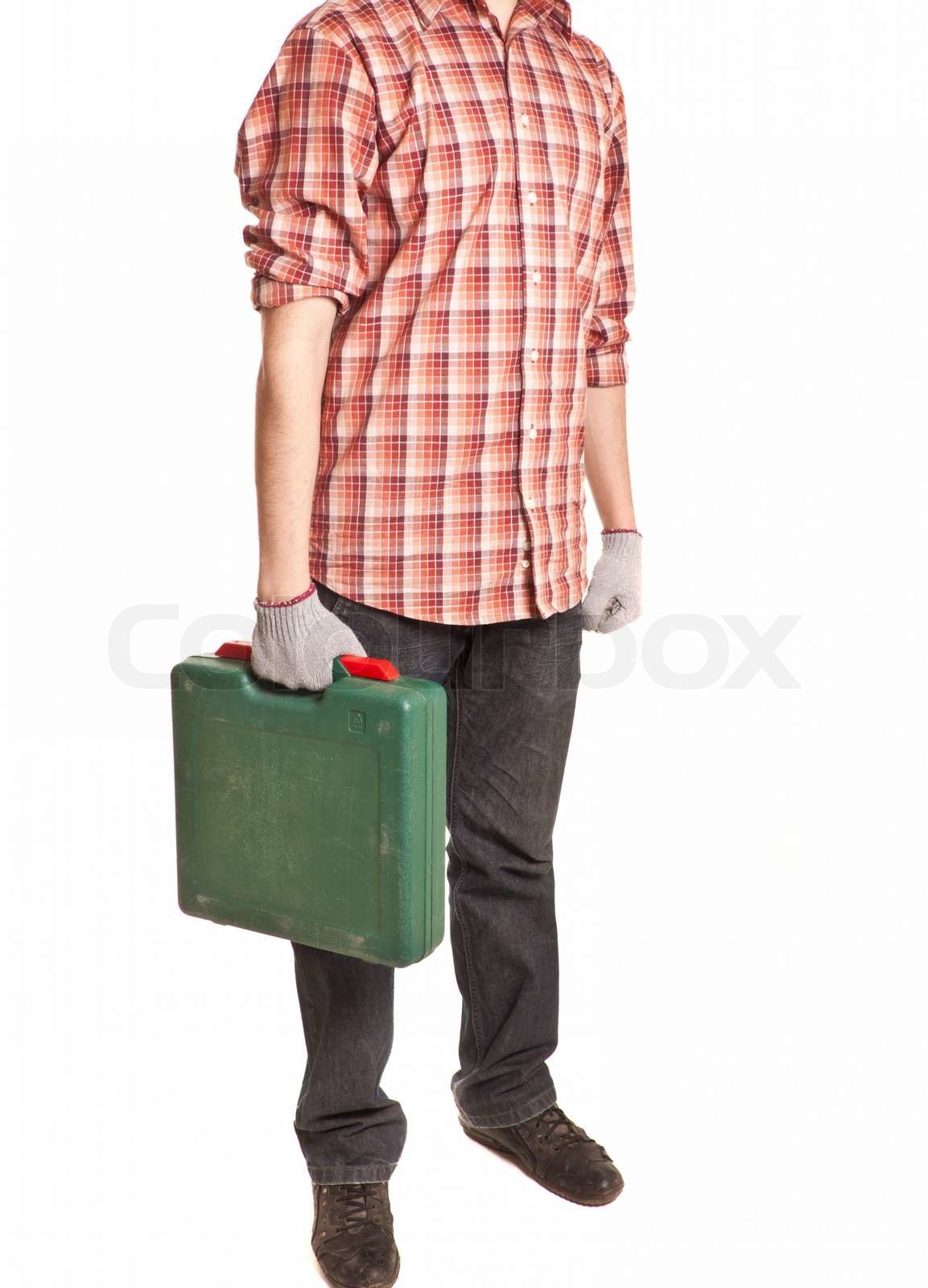man holding toolbox in hand isolaetd on white | Stock image | Colourbox
