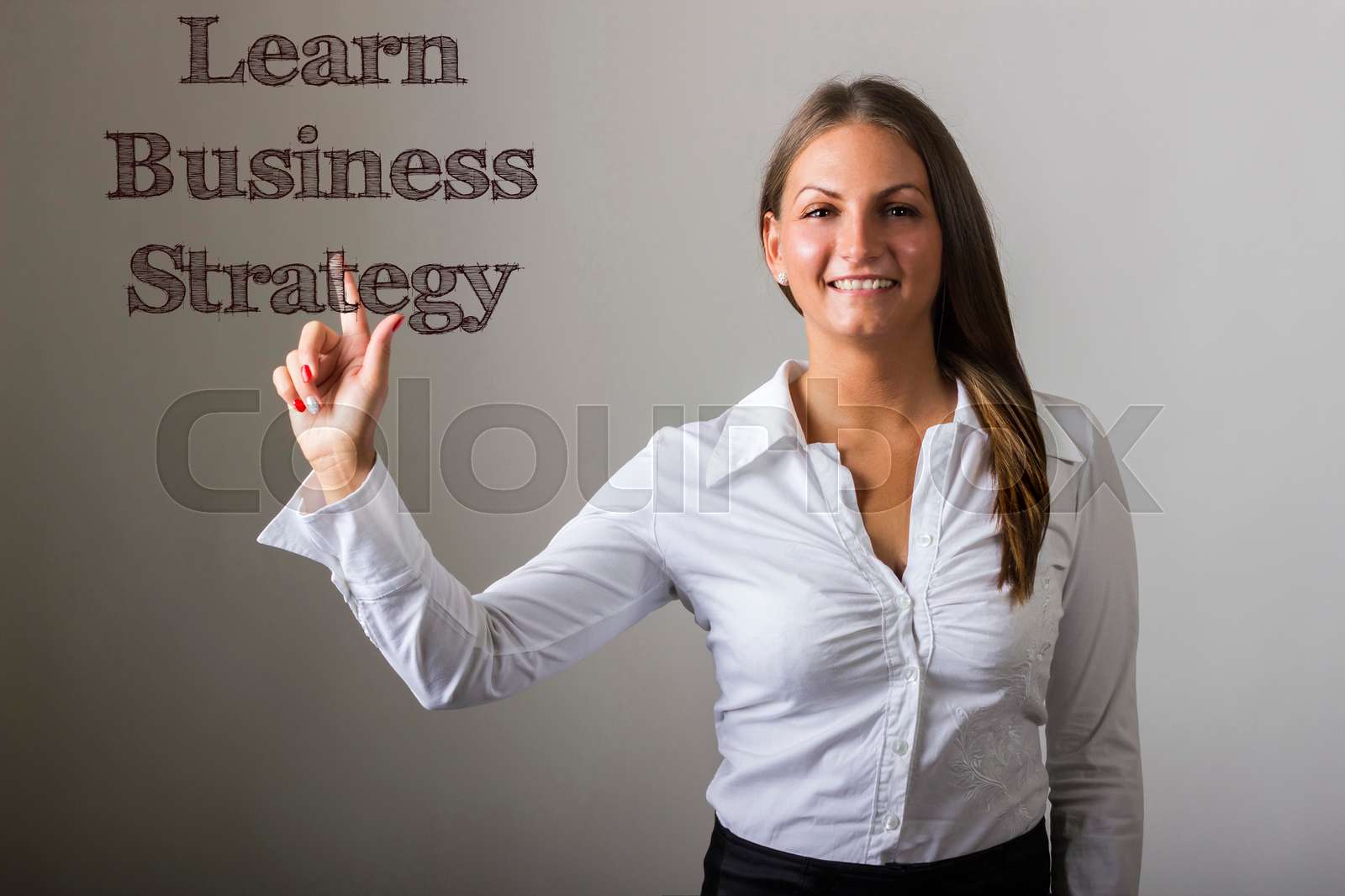 Learn Business Strategy - Beautiful girl touching text on transparent ...