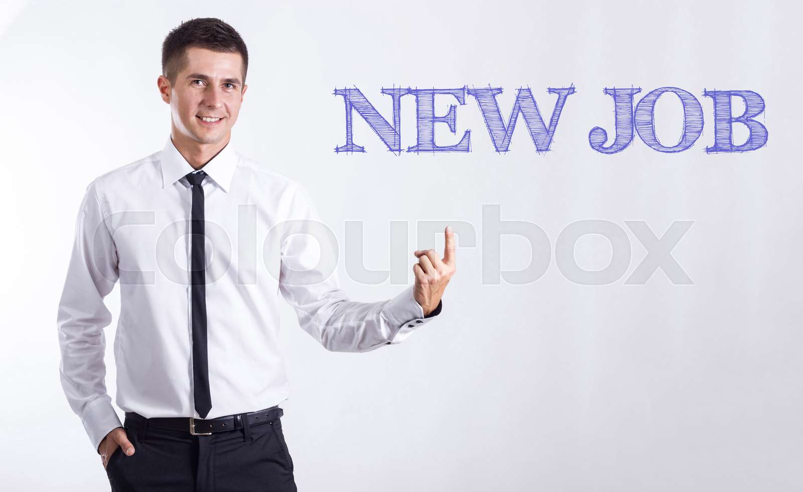 NEW JOB - Young smiling businessman pointing on text | Stock image ...