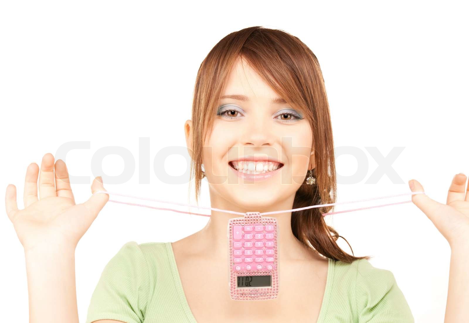 lovely teenage girl with calculator over white | Stock image | Colourbox
