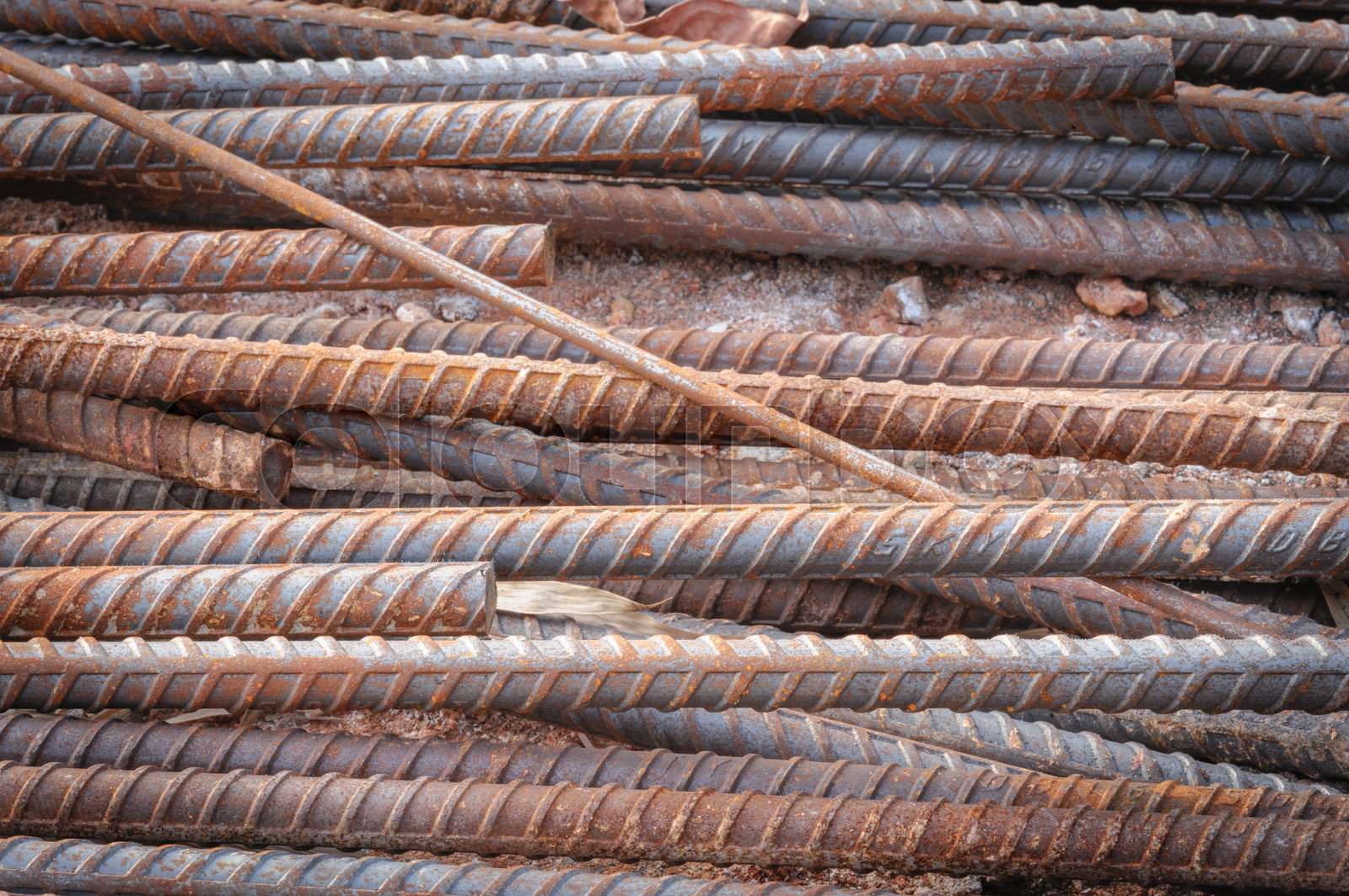 Rusty old rebar steel used in construction. | Stock image | Colourbox