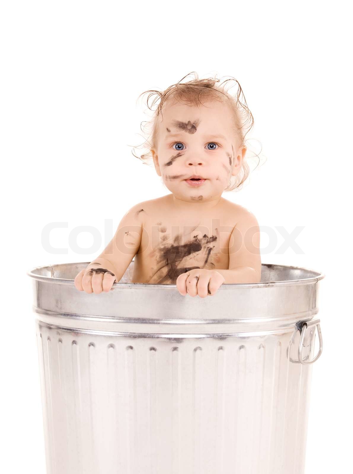 picture of adorable baby in trash can | Stock image | Colourbox