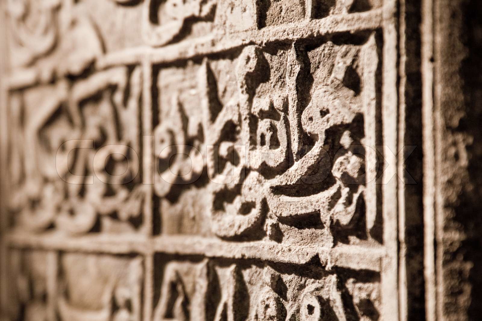 Stone slab applied to a Arabic script | Stock image | Colourbox